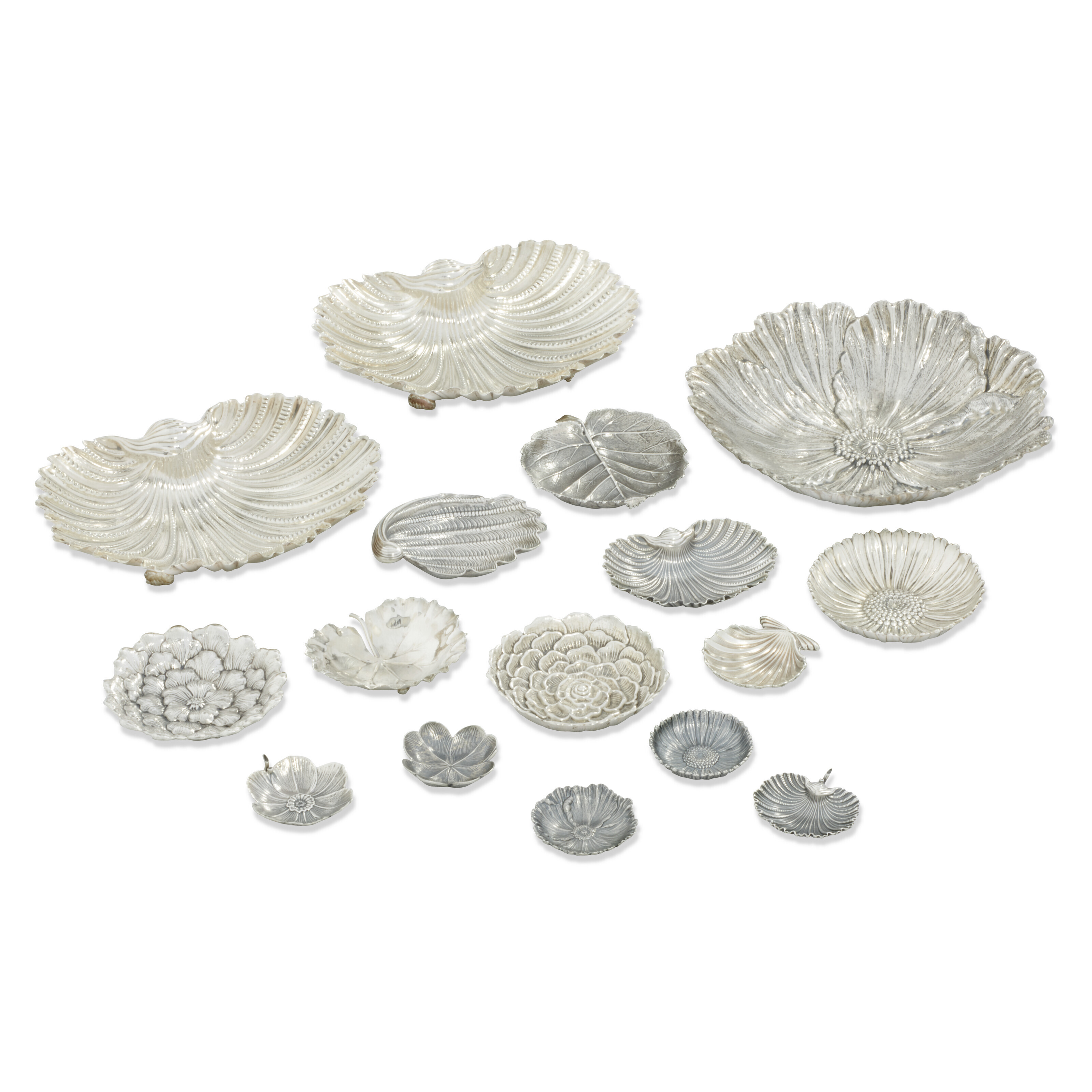 A SET OF SIXTEEN ITALIAN SHELL, LEAF AND FLOWER DISHES, FOURTEEN WITH ...