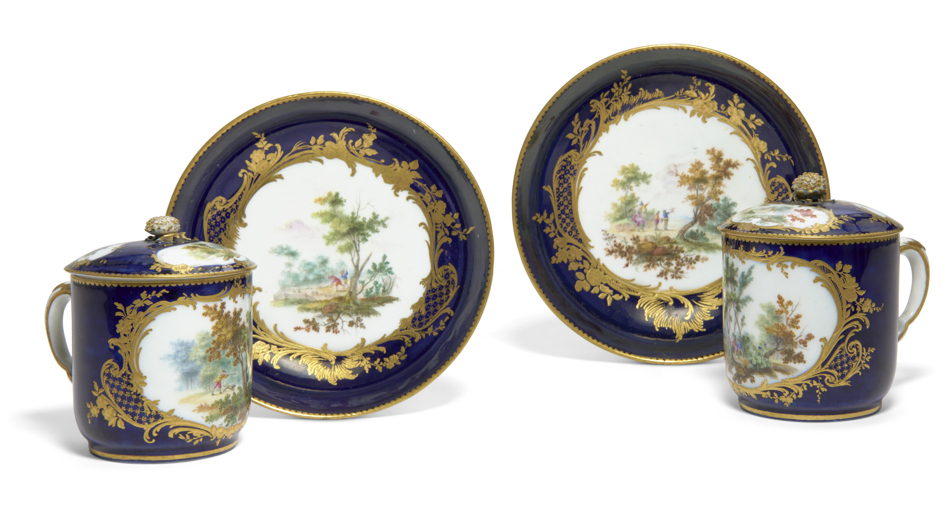 A PAIR OF SEVRES PORCELAIN BLEU LAPIS CUPS, COVERS AND SAUCERS (GOBELET ...