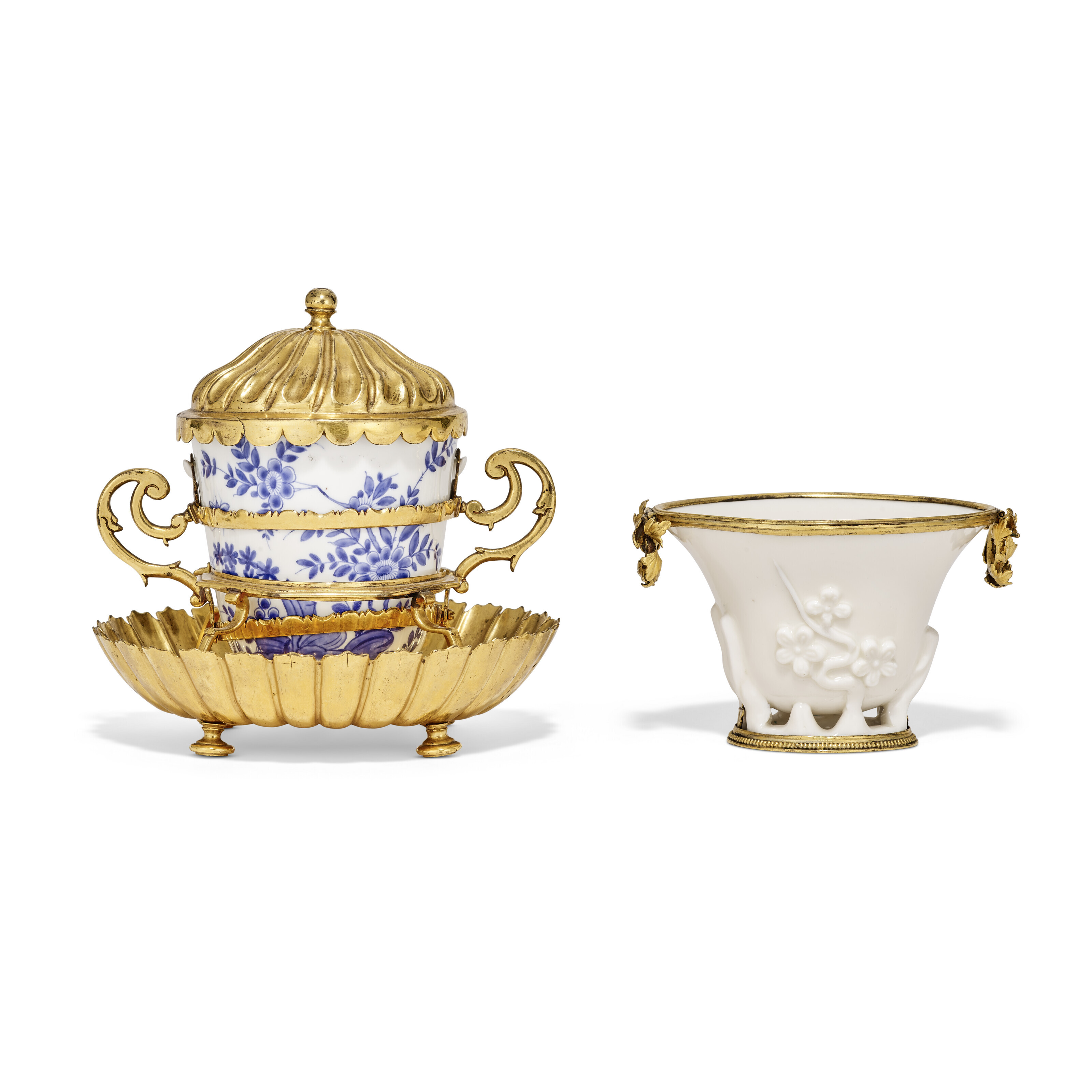 A SILVER-GILT-MOUNTED SEVRES PORCELAIN BLUE AND WHITE BEAKER, SILVER ...