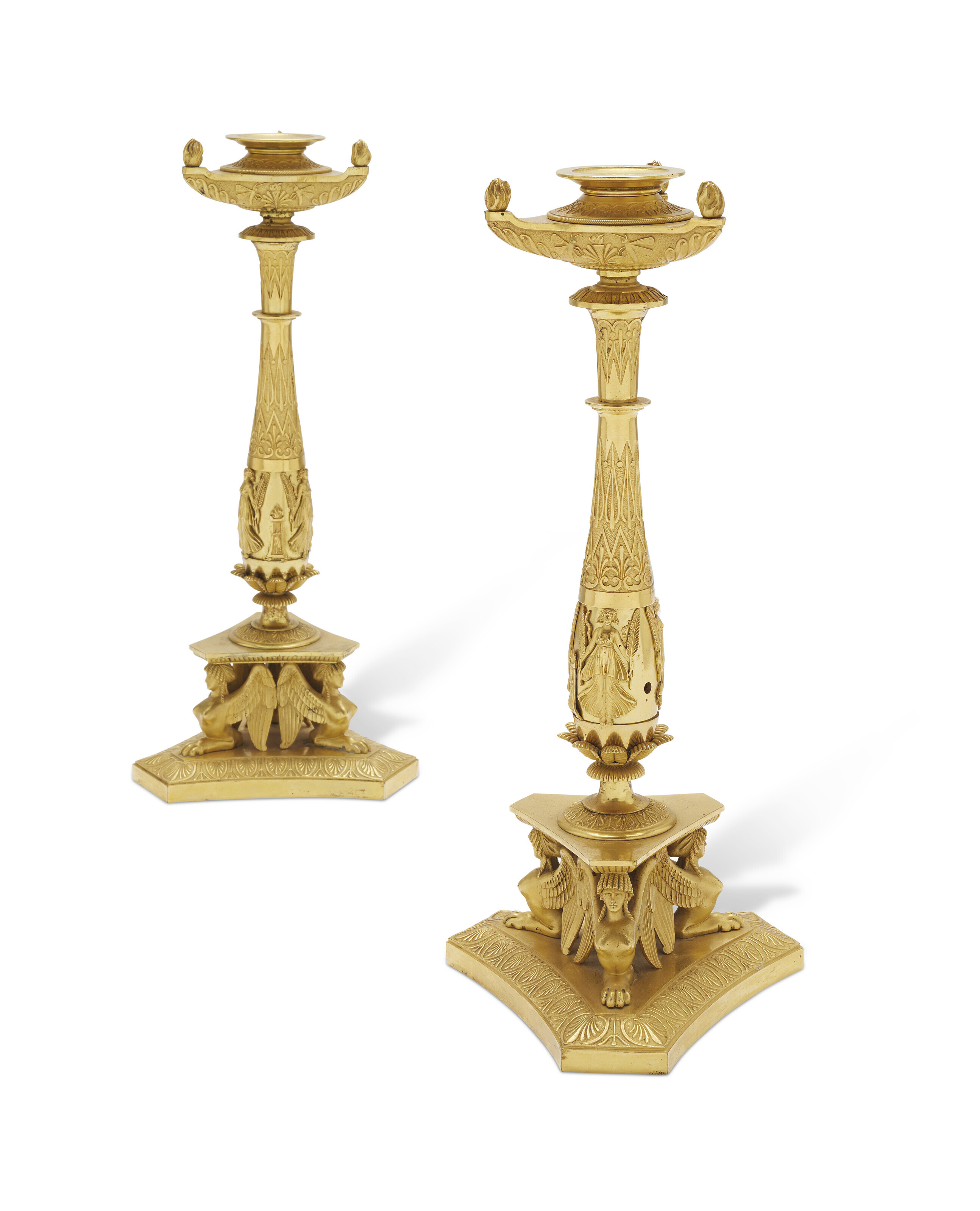 A PAIR OF GEORGE III ORMOLU CANDLESTICKS, ATTRIBUTED TO ALEXIS DECAIX ...