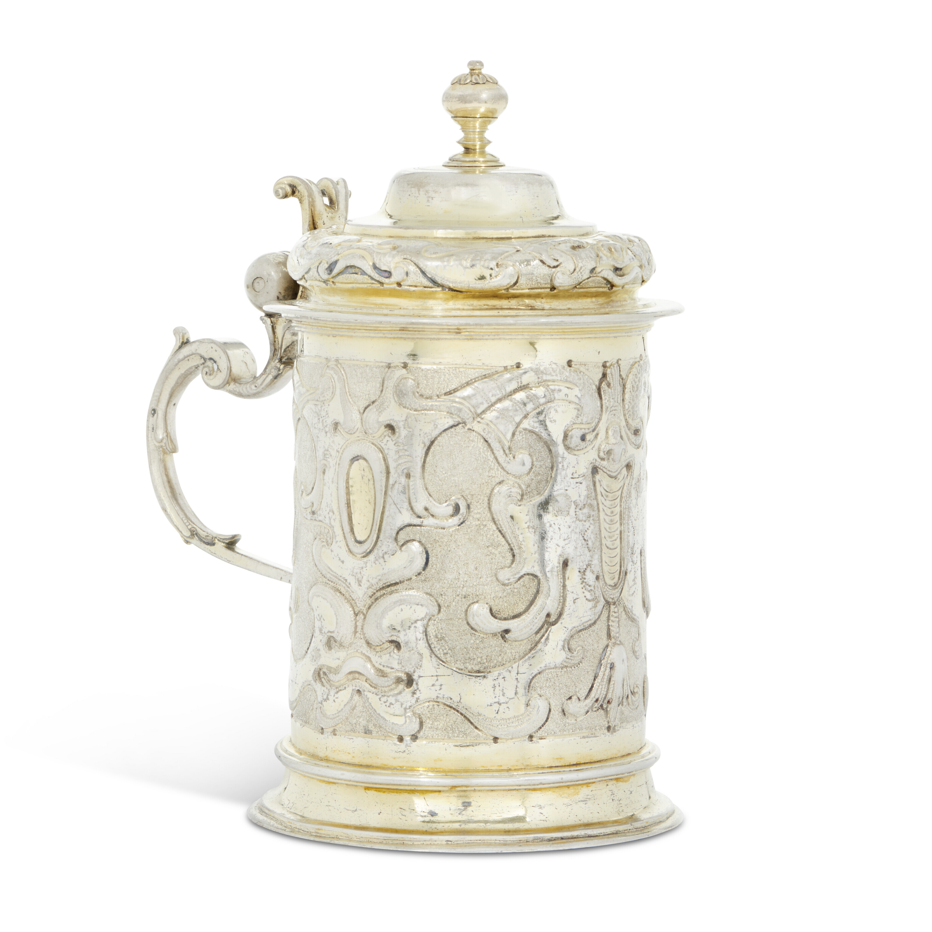A GERMAN PARCEL-GILT SILVER TANKARD, MARK OF HANS JACOB I BAUR ...