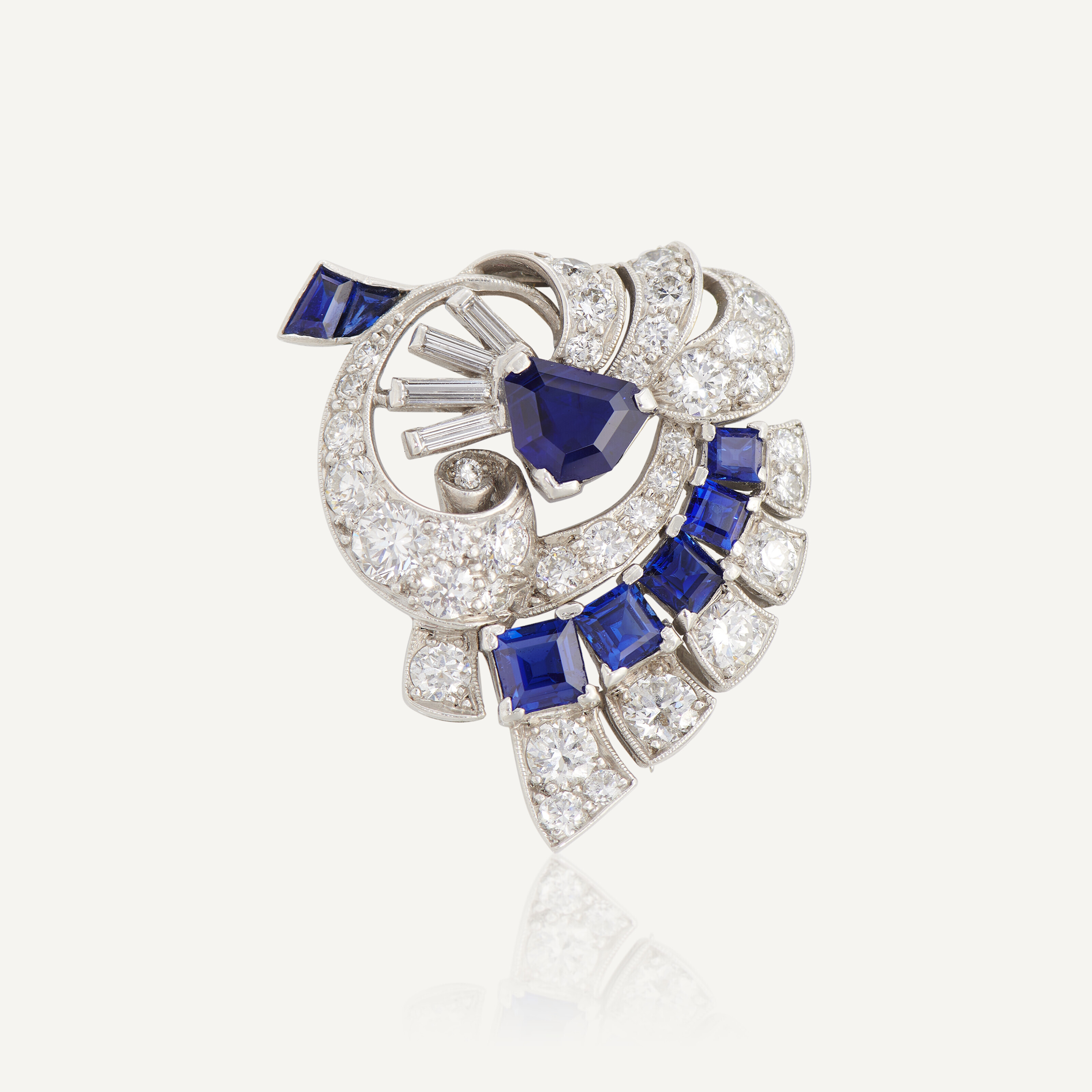 RAYMOND YARD ART DECO SAPPHIRE AND DIAMOND CLIP BROOCH, | Christie’s