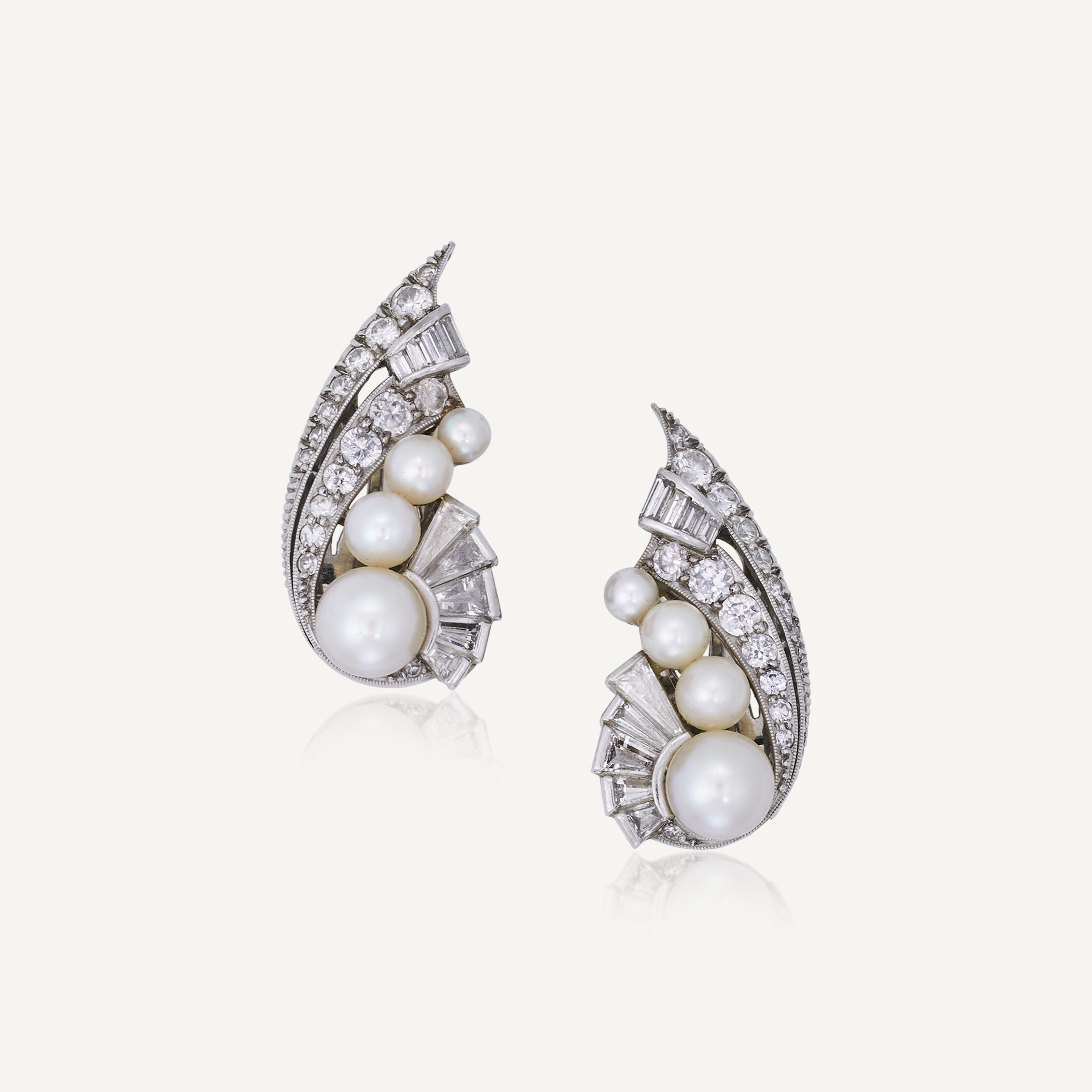 RAYMOND YARD ART DECO PEARL AND DIAMOND CLIPS, | Christie’s