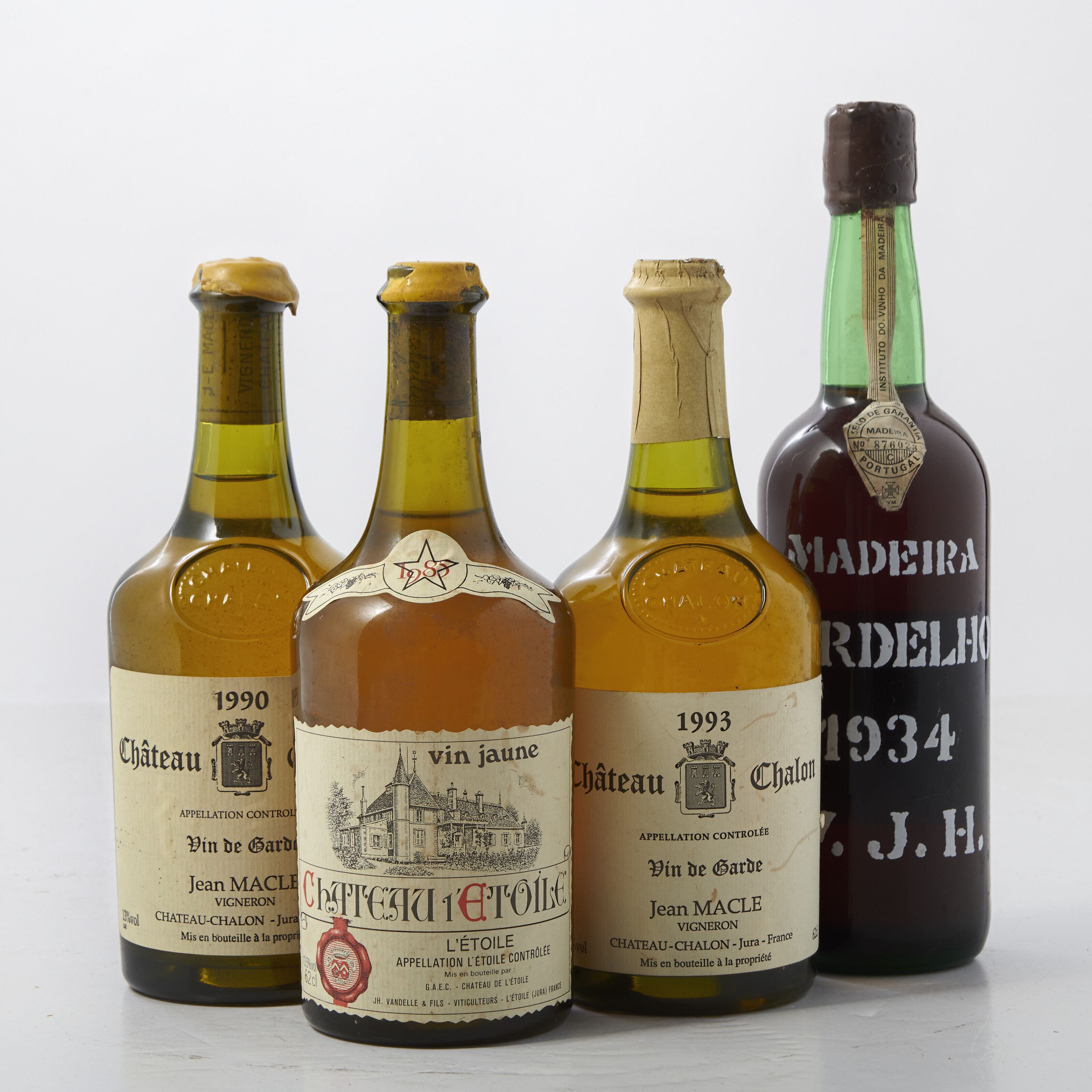 Mixed Jura and Madeira, Justino's Verdelho 1934Level: base of neck (1 ...