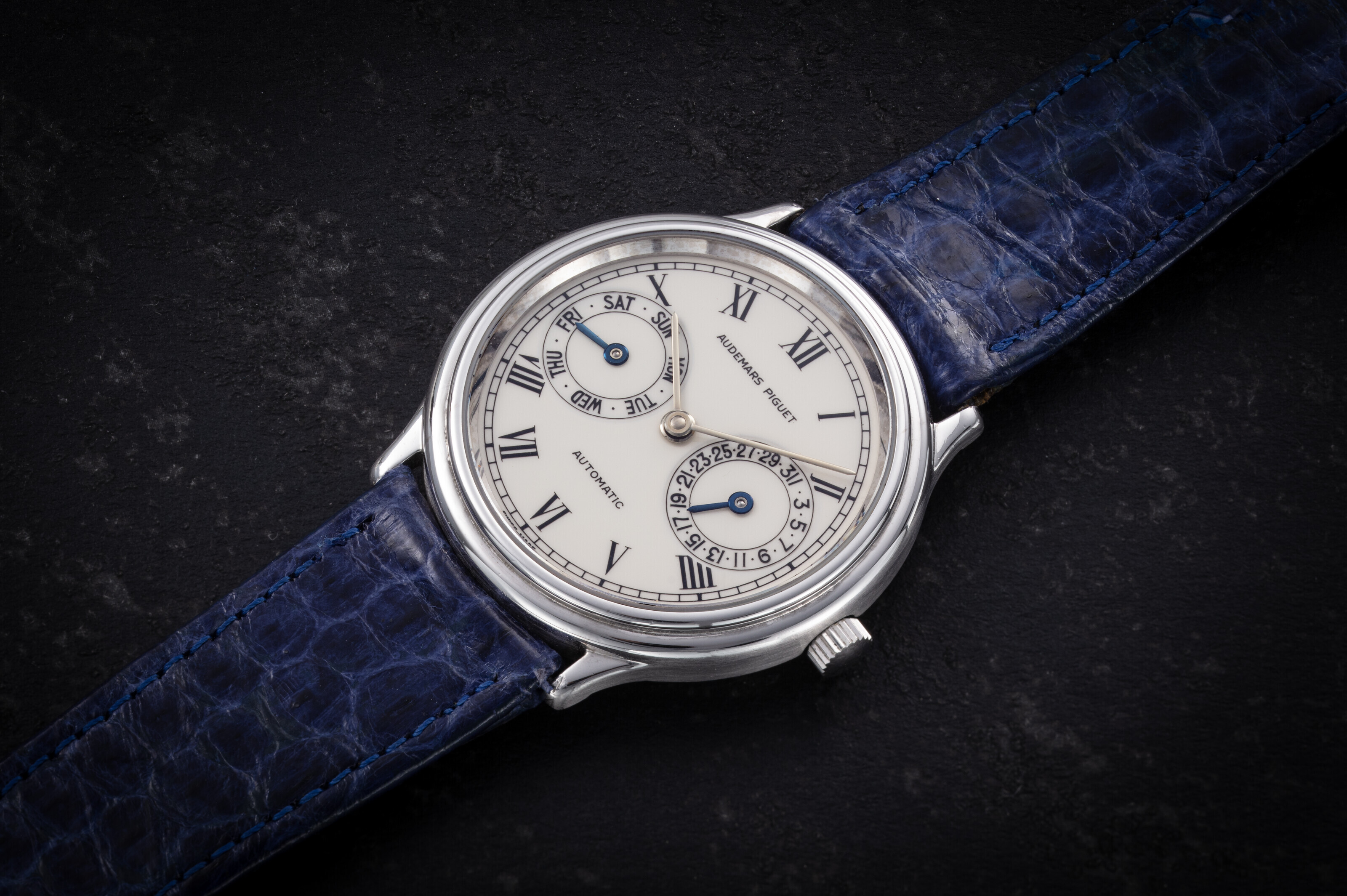AUDEMARS PIGUET, DAY-DATE REF. 5574BC, A FINE WHITE GOLD AUTOMATIC ...
