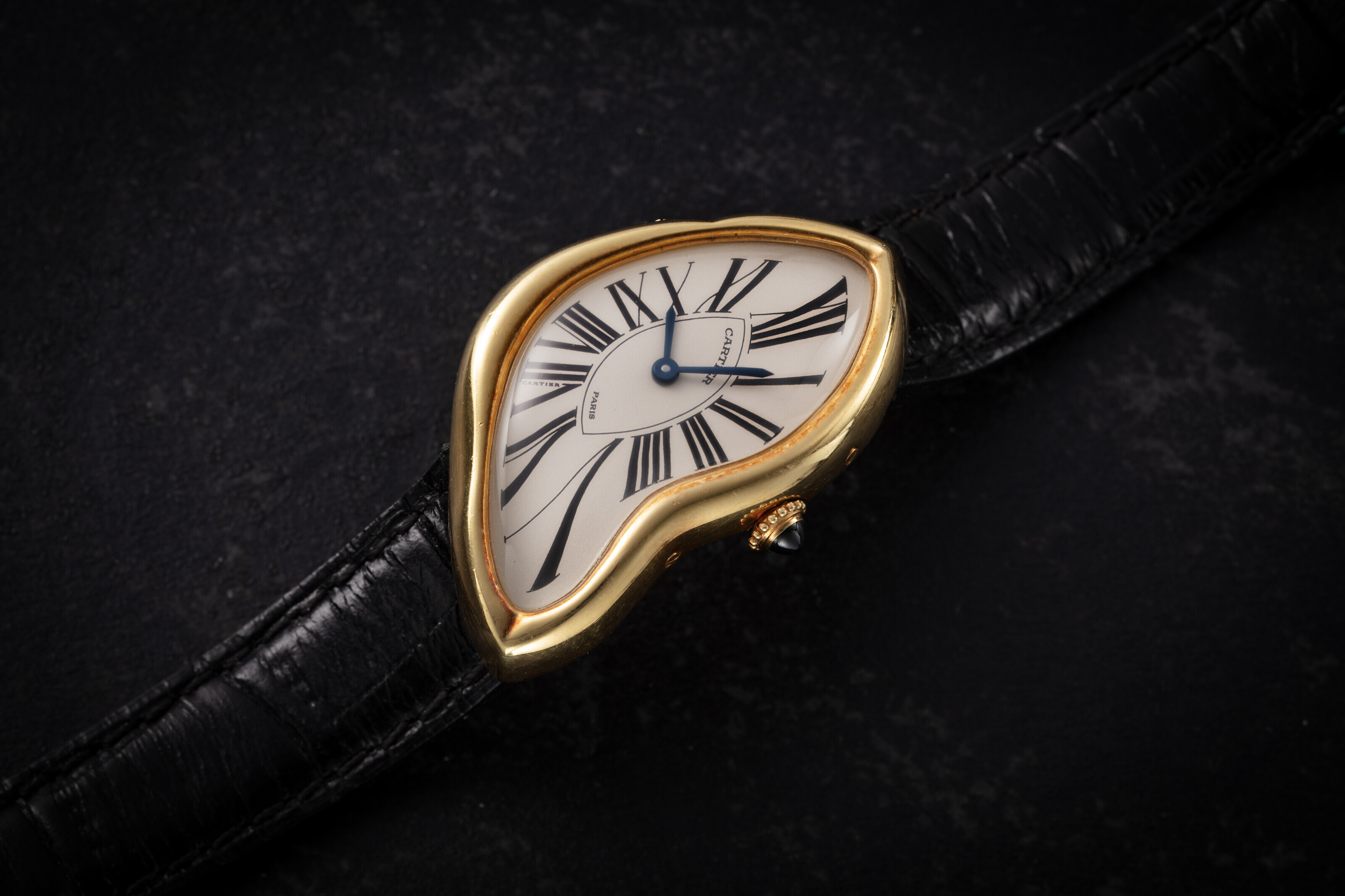 CARTIER, CRASH, A RARE LIMITED EDITION ASYMMETRIC GOLD WRISTWATCH, CASE ...