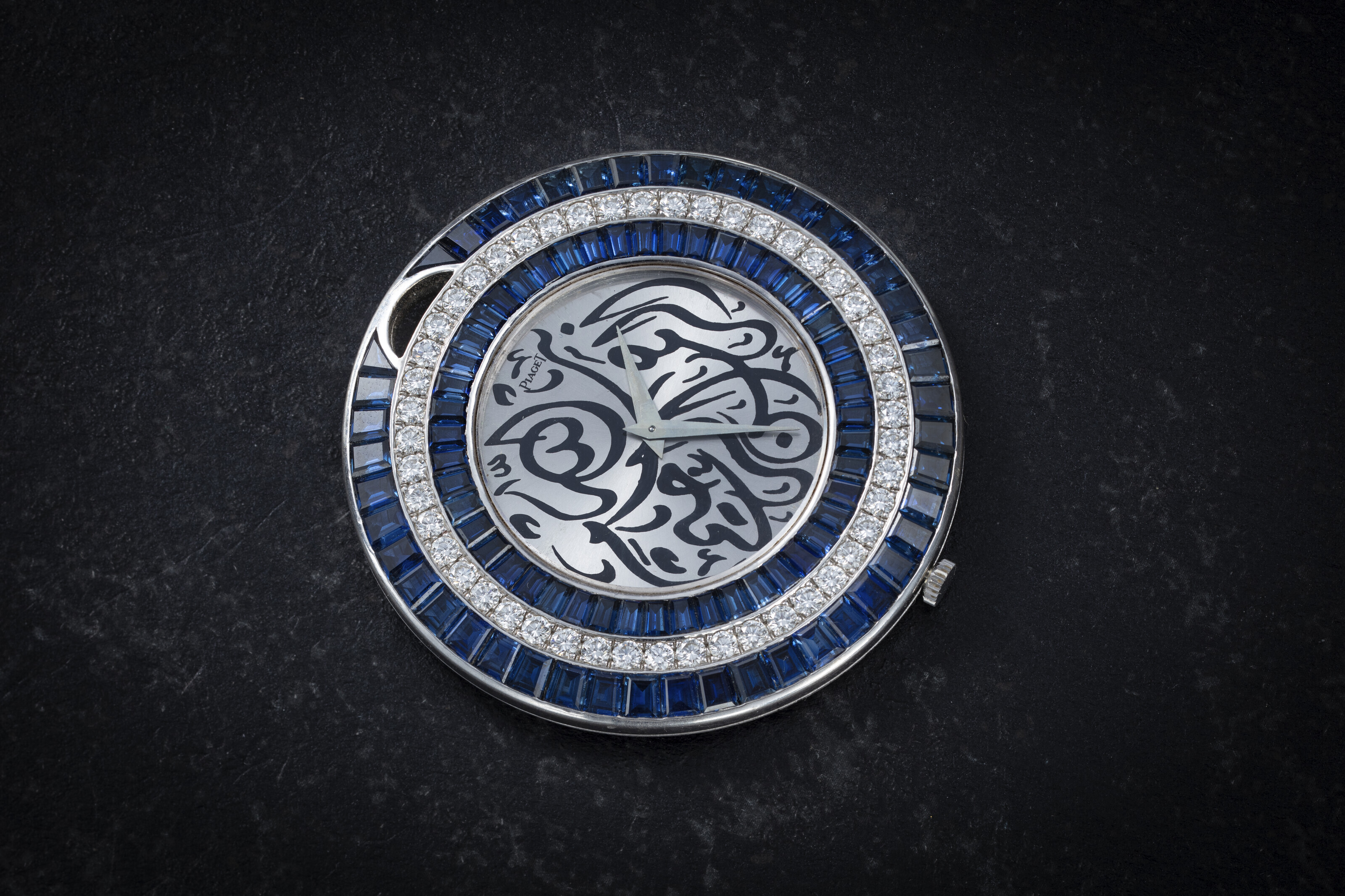 PIAGET, A GOLD AND SAPPHIRE-SET PENDANT WATCH RETAILED BY APSREY WITH ...