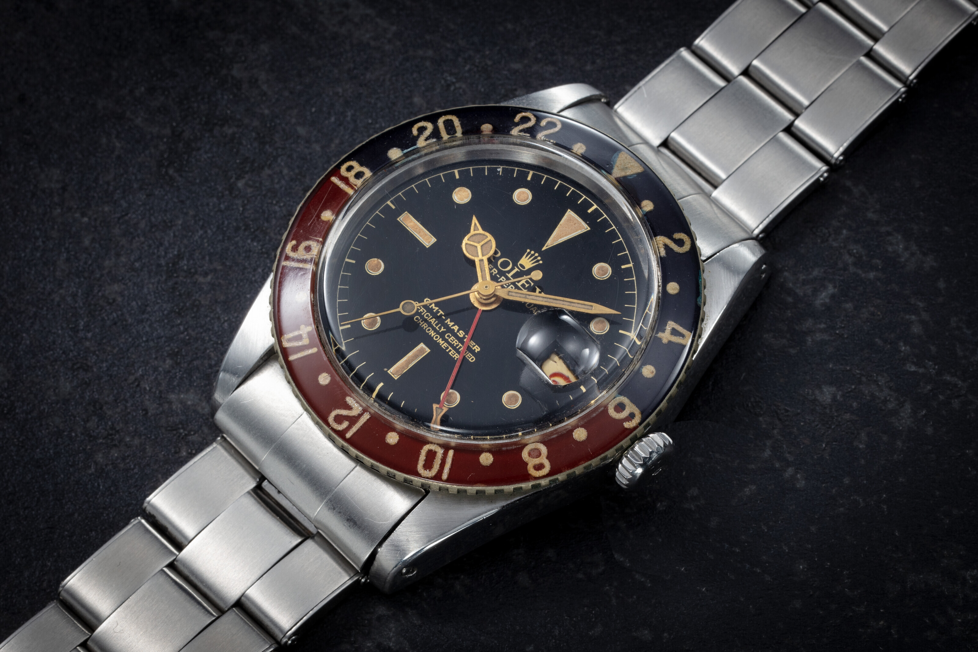 ROLEX, GMT-MASTER REF. 6542 'BAKELITE', A RARE AND IMPORTANT STEEL DUAL ...