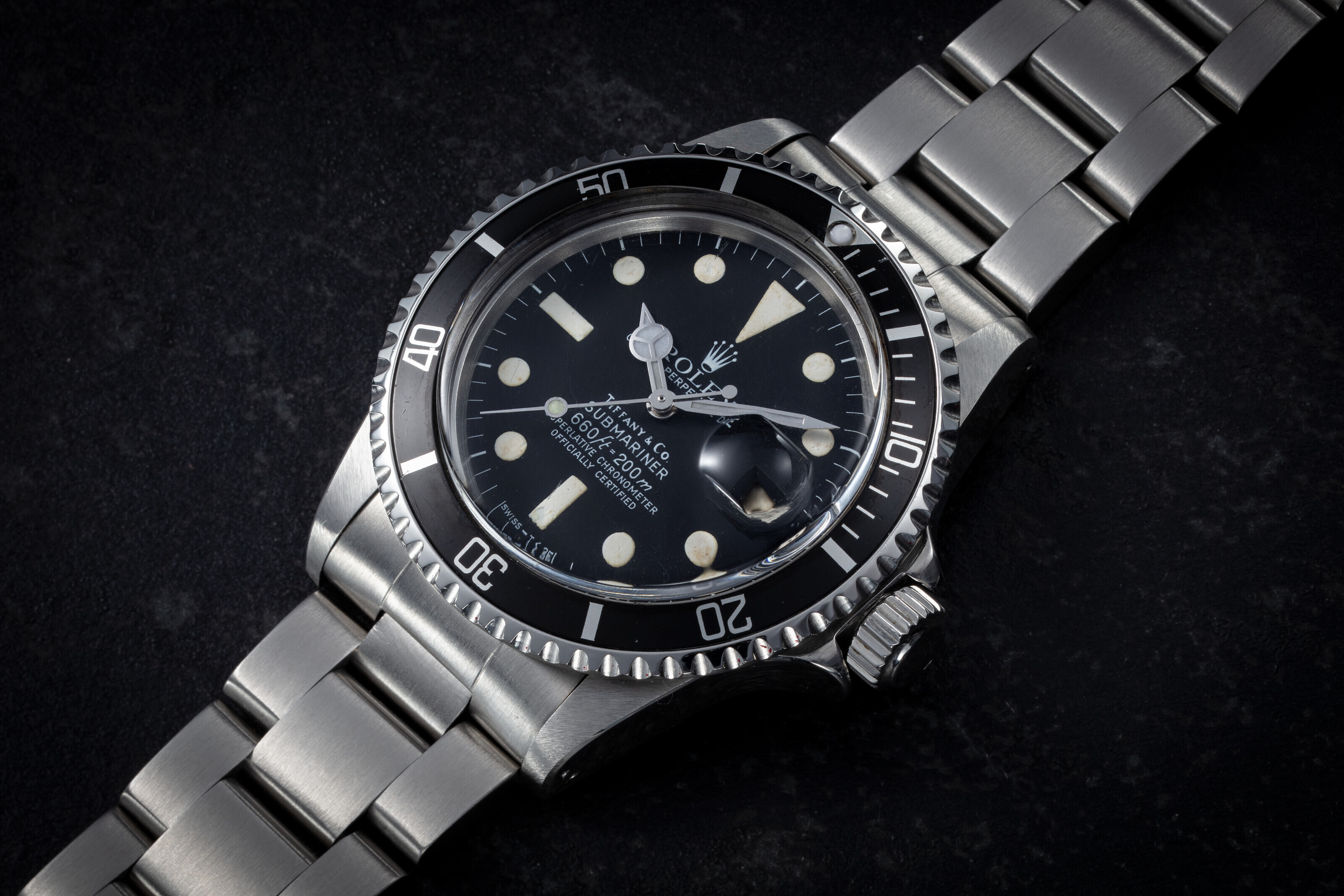 ROLEX, SUBMARINER REF. 1680 'TIFFANY', AN ATTRACTIVE AND RARE STEEL ...