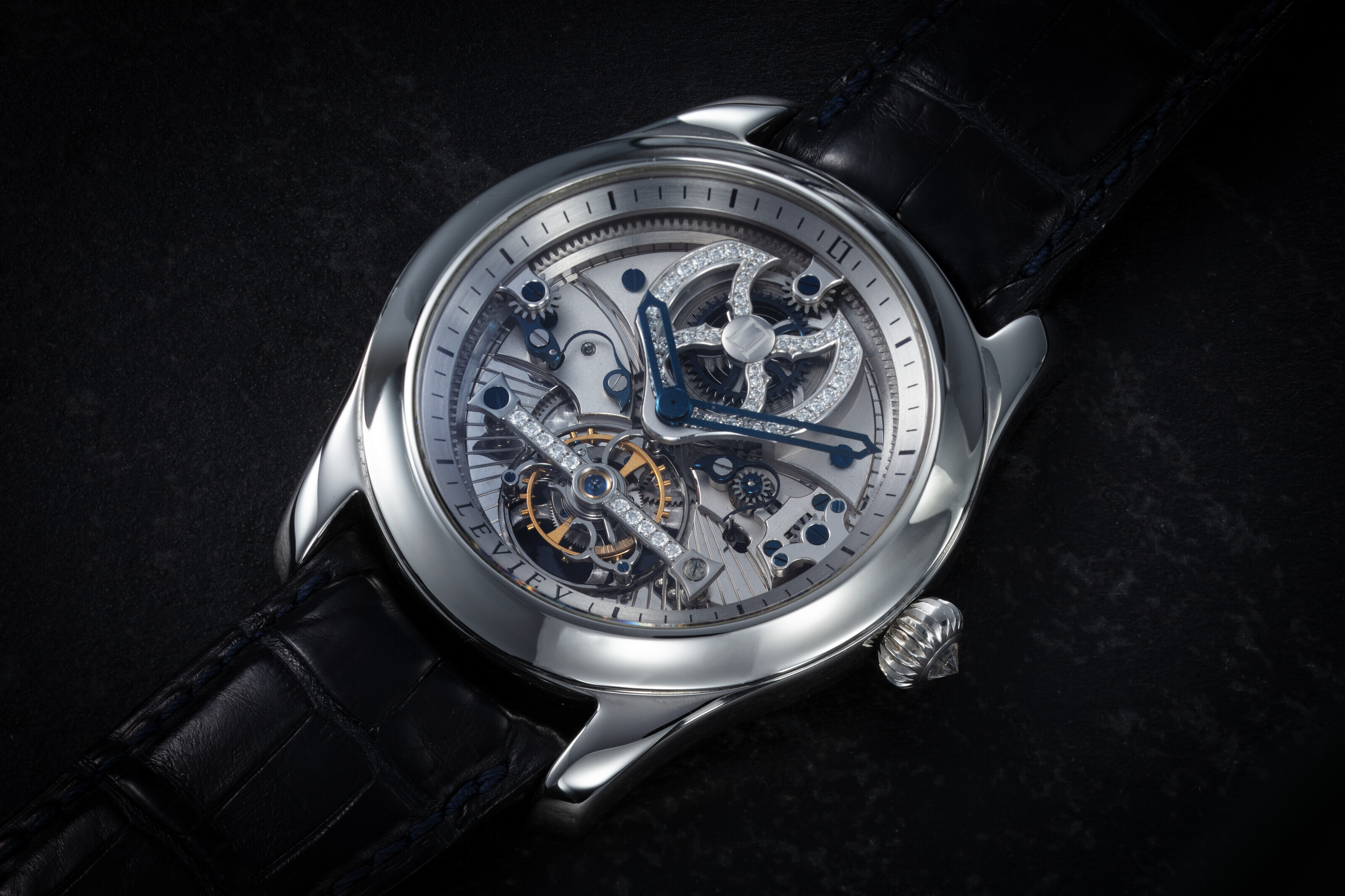 LEVIEV, A PLATINUM AND DIAMOND-SET OPEN-WORKED TOURBILLON WRISTWATCH ...
