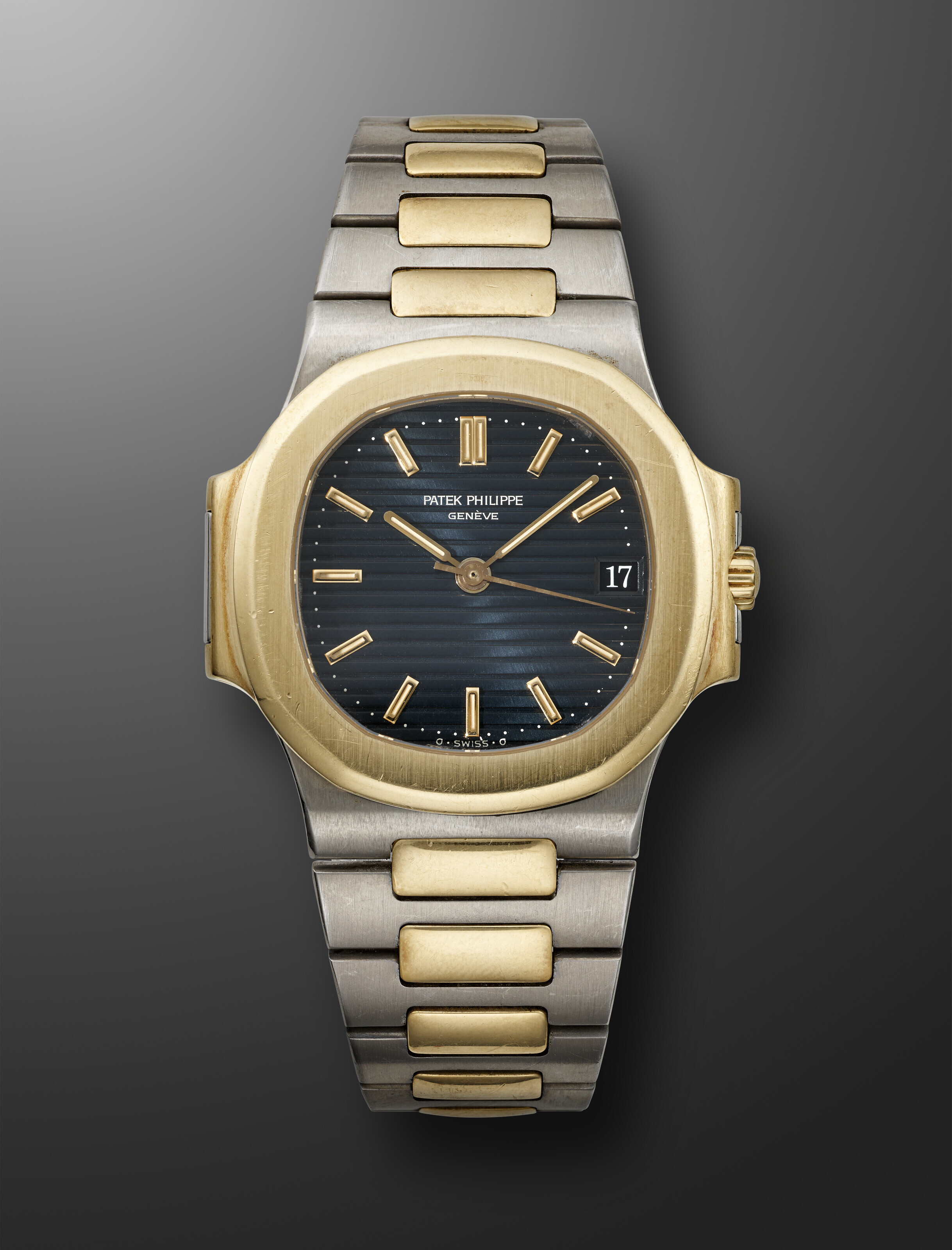 PATEK PHILIPPE, STAINLESS STEEL AND YELLOW GOLD 'NAUTILUS', REF. 3800 ...