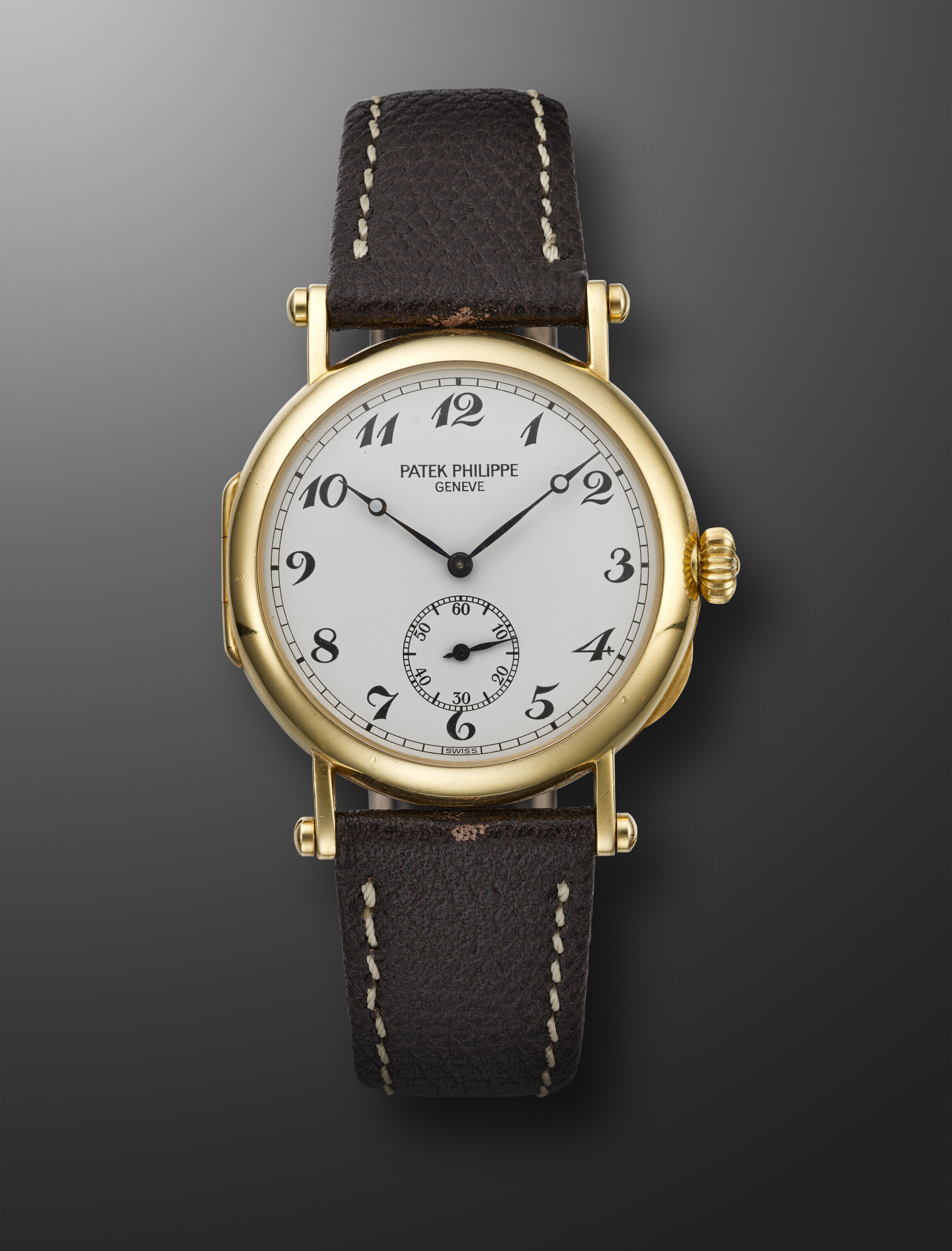 PATEK PHILIPPE, YELLOW GOLD WRISTWATCH WITH 'OFFICER CASEBACK', MADE ...