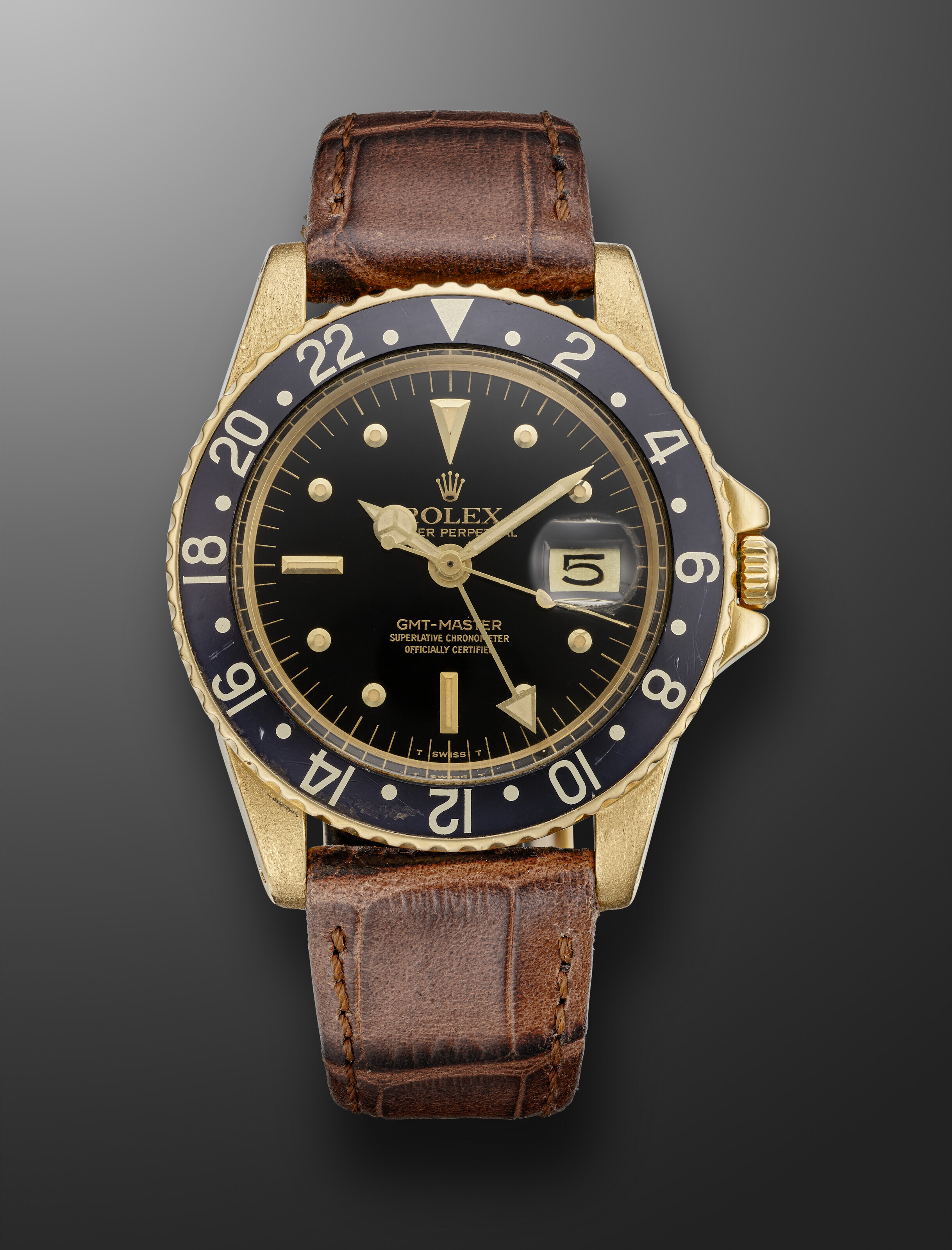 ROLEX, YELLOW GOLD DUAL TIME 'GMT-MASTER', REF. 1675/8, | Christie’s