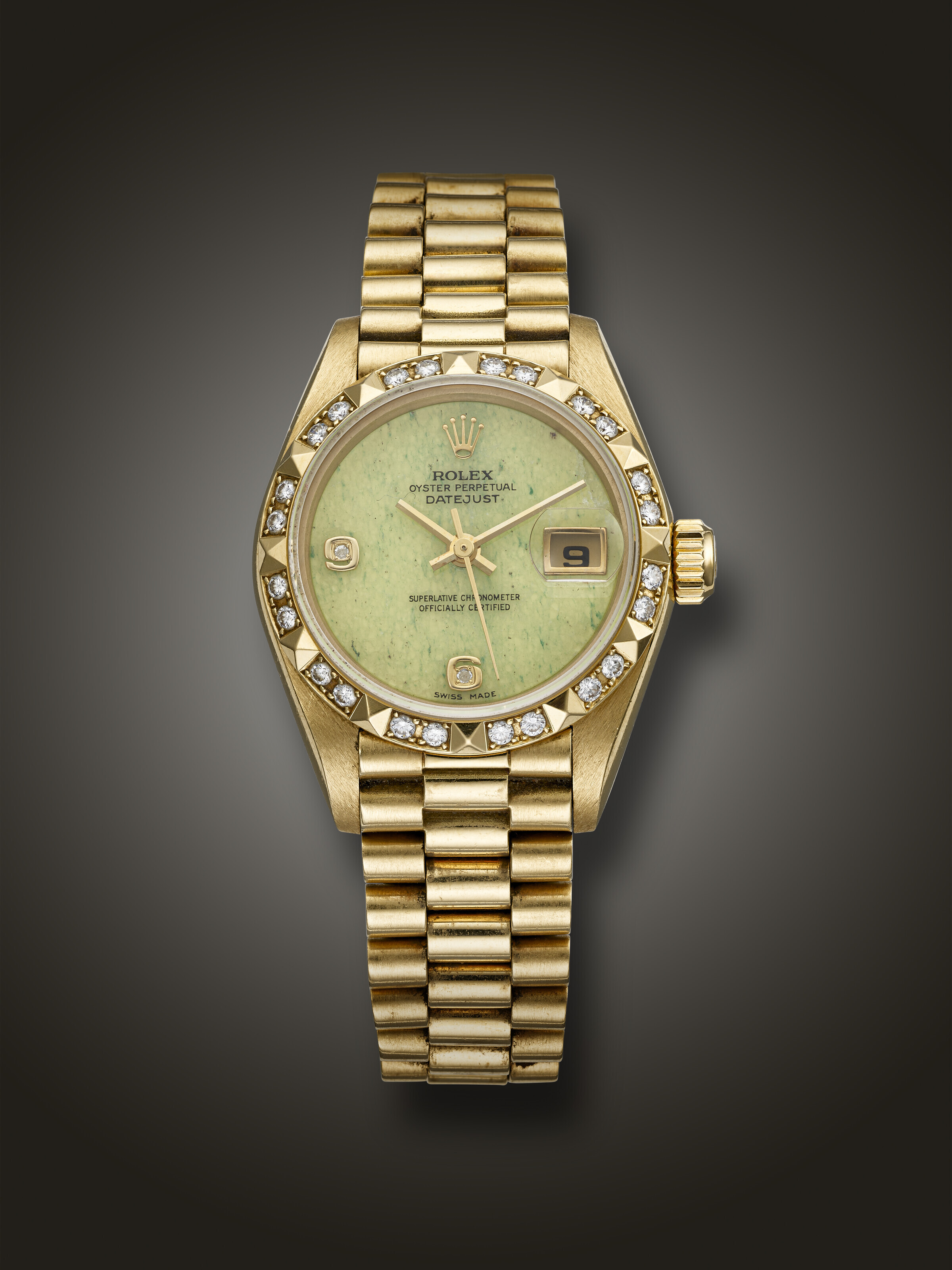 ROLEX, LADY YELLOW GOLD AND DIAMOND-SET ‘DATEJUST’, WITH GREEN STONE ...