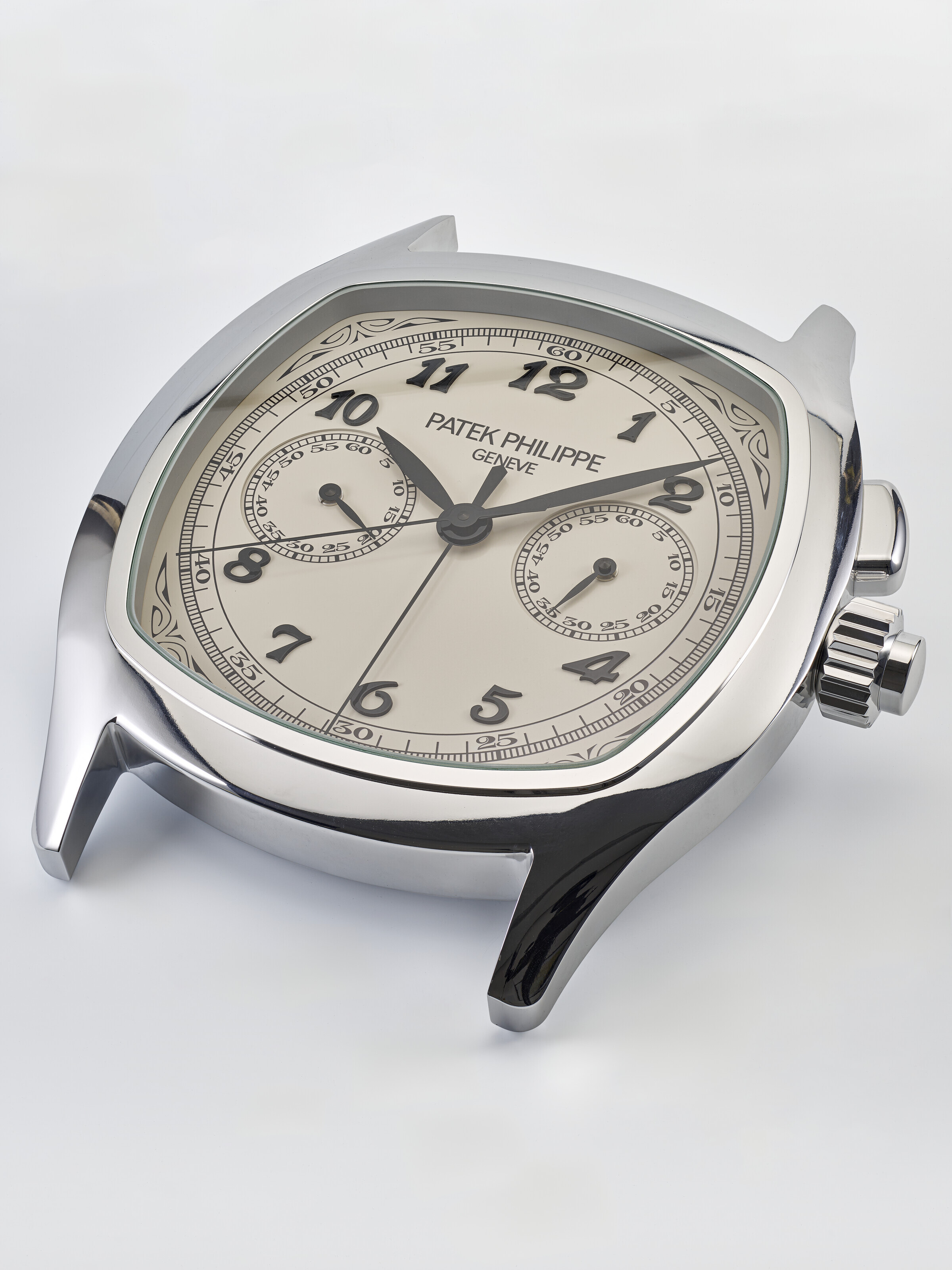 INDUCTA FOR PATEK PHILIPPE, RARE AND LARGE STAINLESS STEEL WALL CLOCK ...