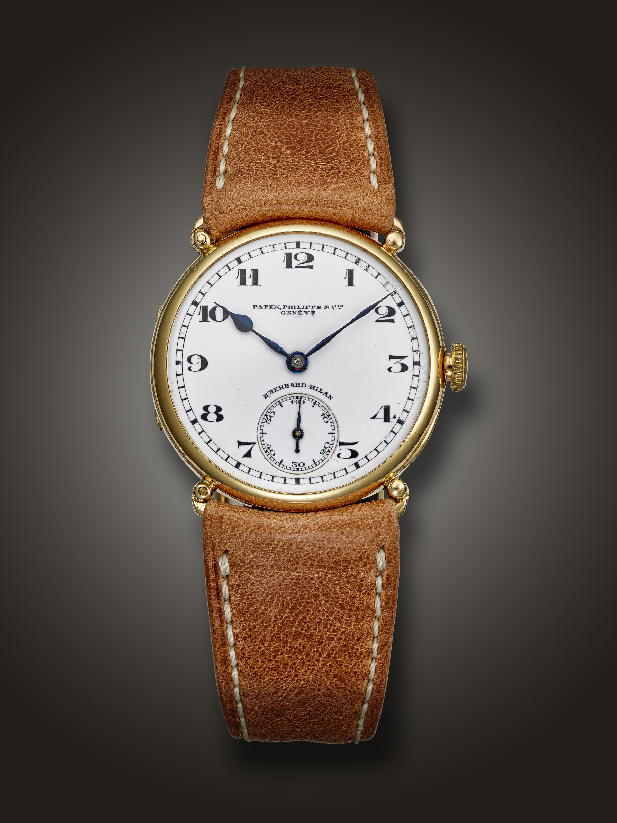 PATEK PHILIPPE, ATTRACTIVE AND EARLY YELLOW GOLD 'OFFICIER' STYLE ...