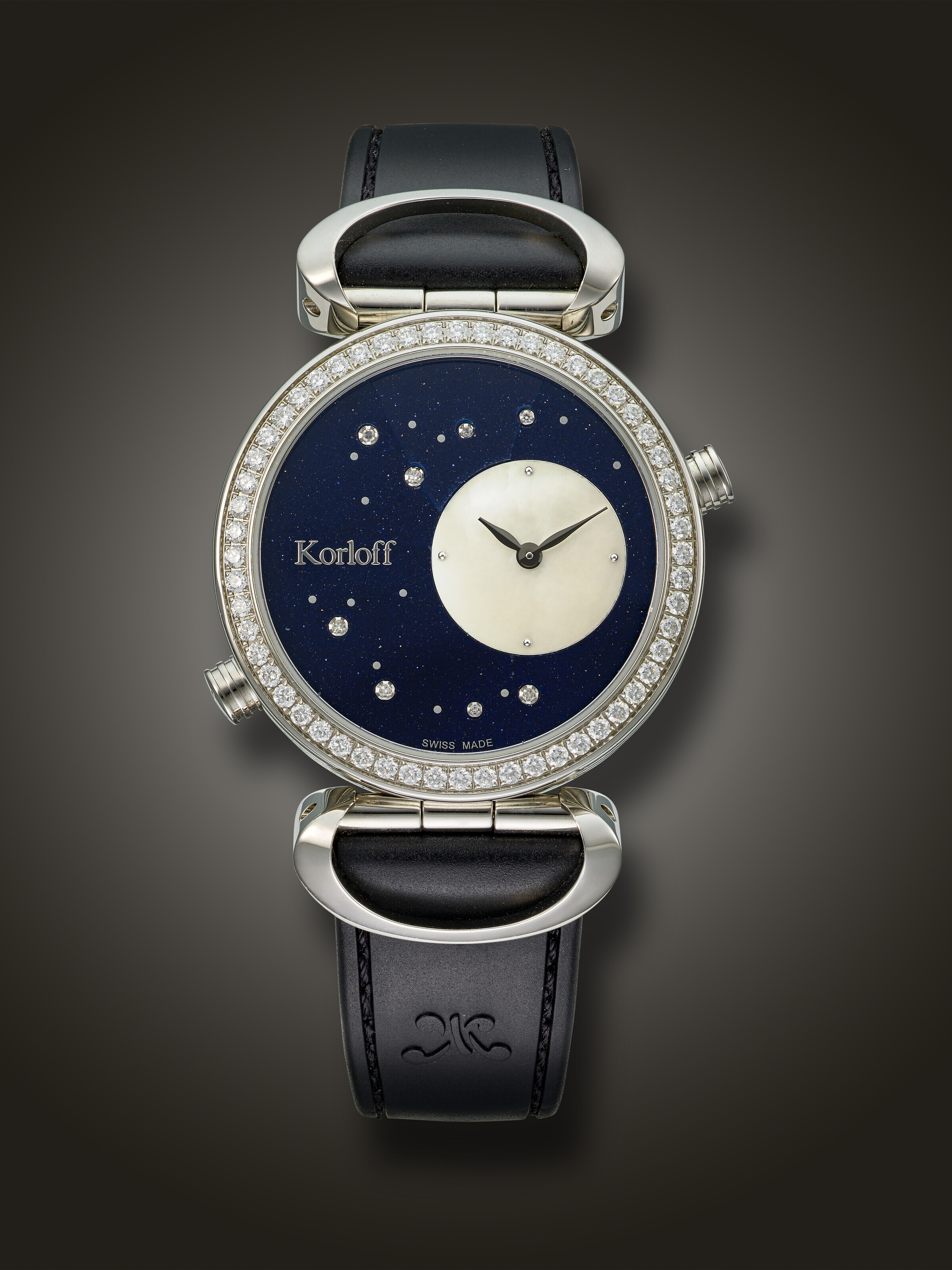 KORLOFF, STAINLESS STEEL TWO-SIDED WRISTWATCH, | Christie’s