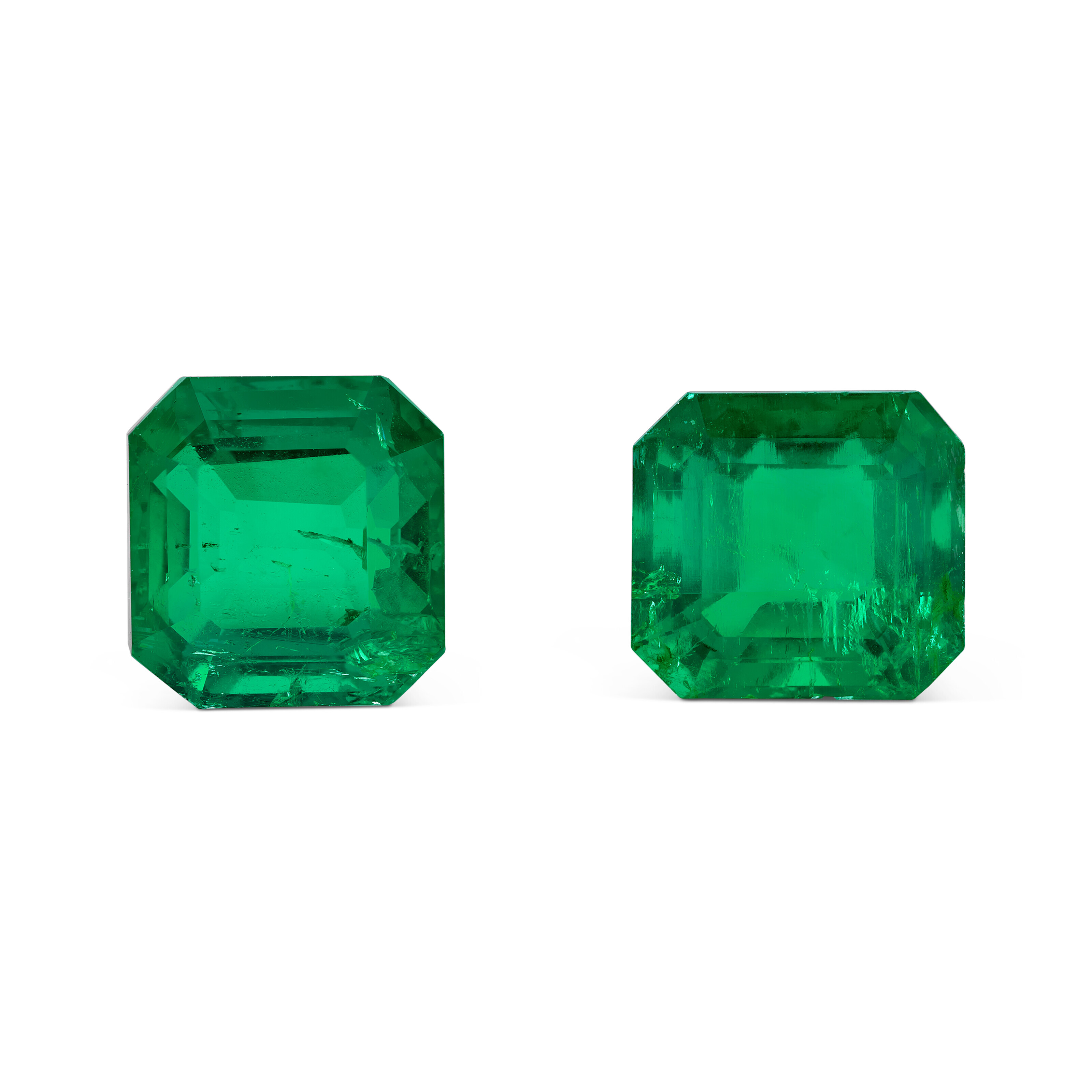TWO UNMOUNTED EMERALDS, SSEF 2.241 and 2.101 carats, Colombia, minor ...