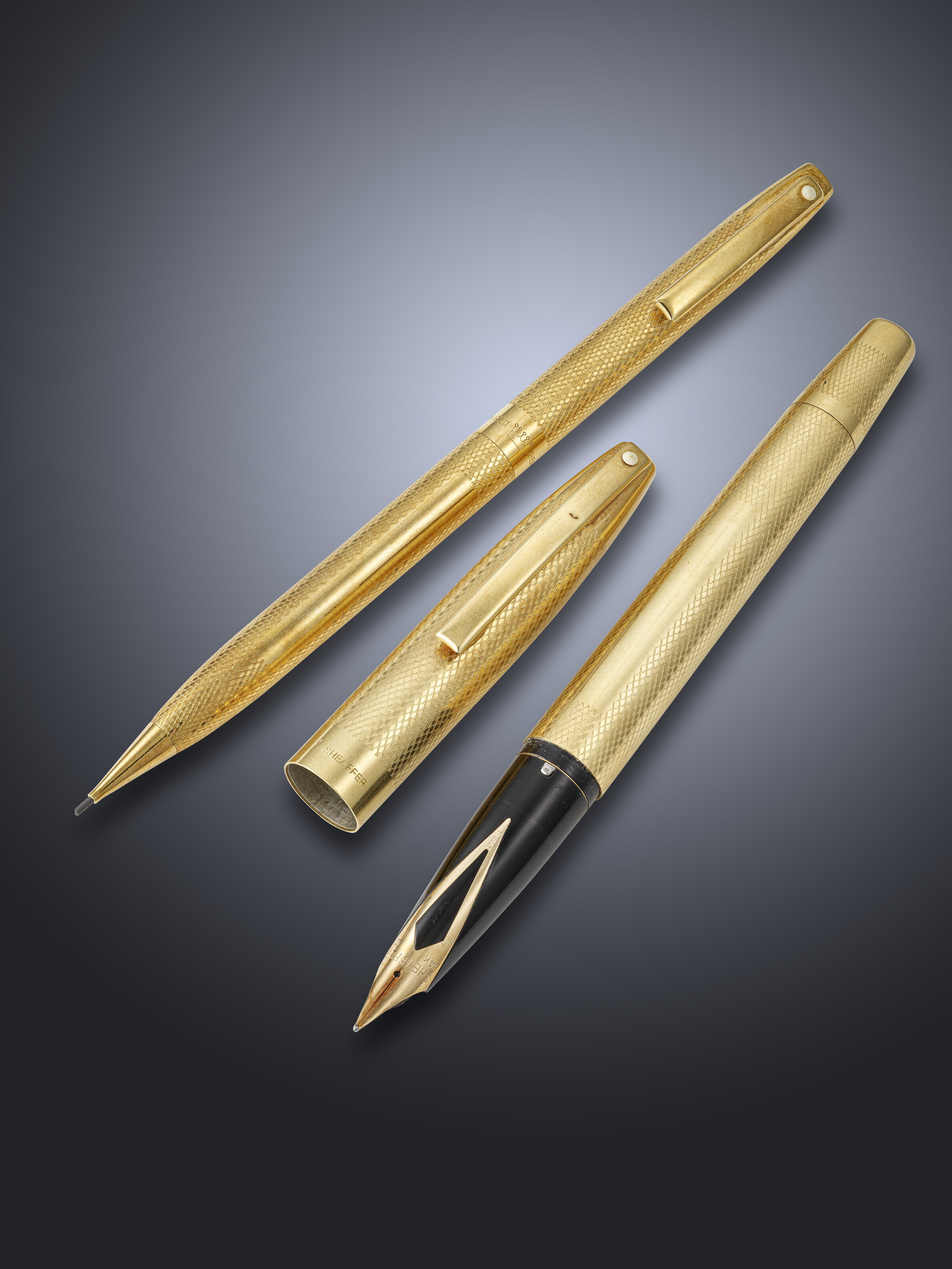 SHEAFFER, SET OF 2 18K YELLOW GOLD PEN, | Christie’s