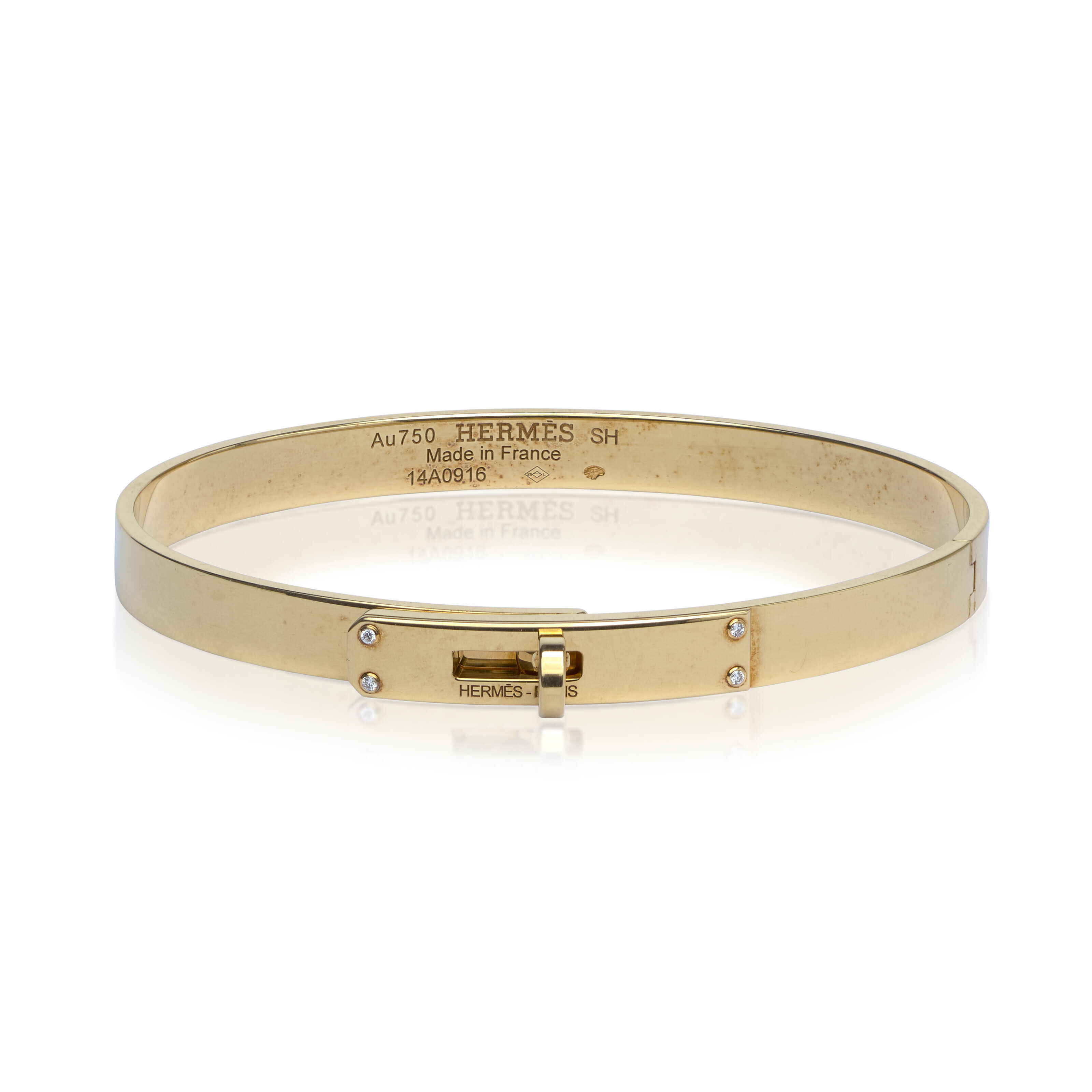 AN 18K YELLOW GOLD & DIAMOND KELLY BANGLE BRACELET, HERMÈS, 2018 ...