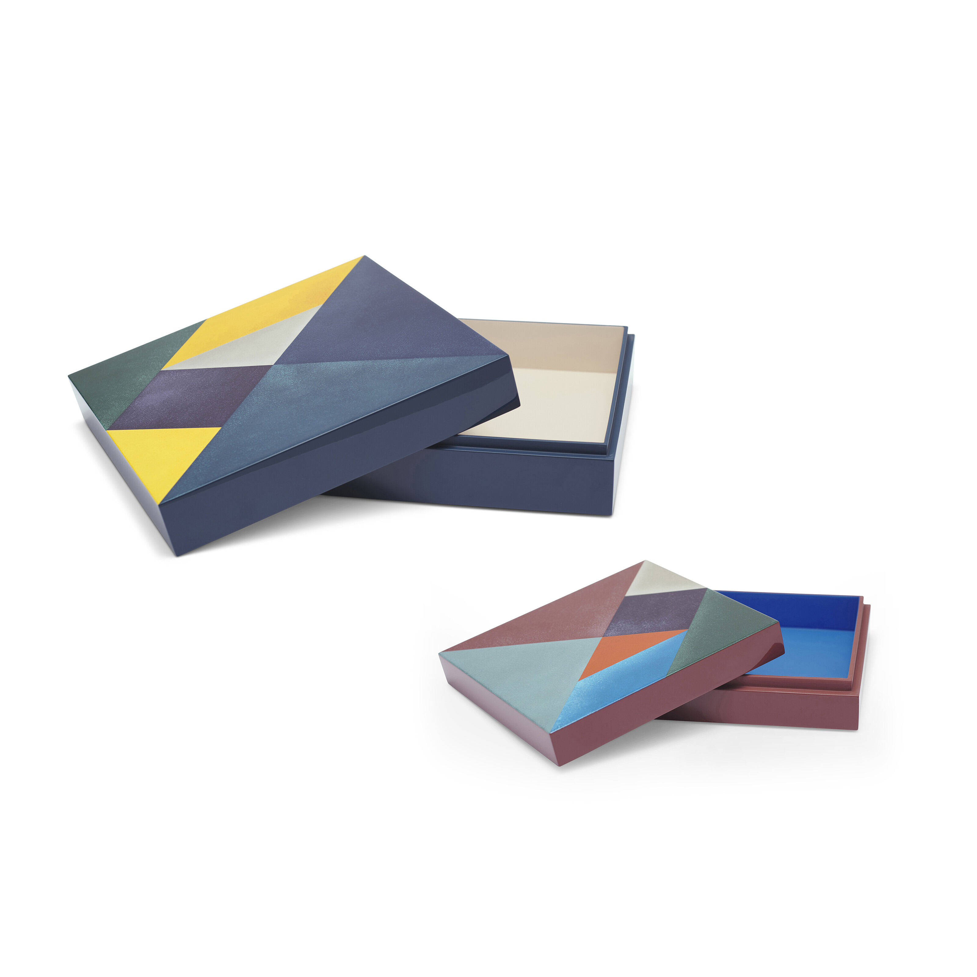 A SET OF TWO: AN INDIGO LACQUER TANGRAM BOX SIZE MEDIUM AND AN ACAJOU ...