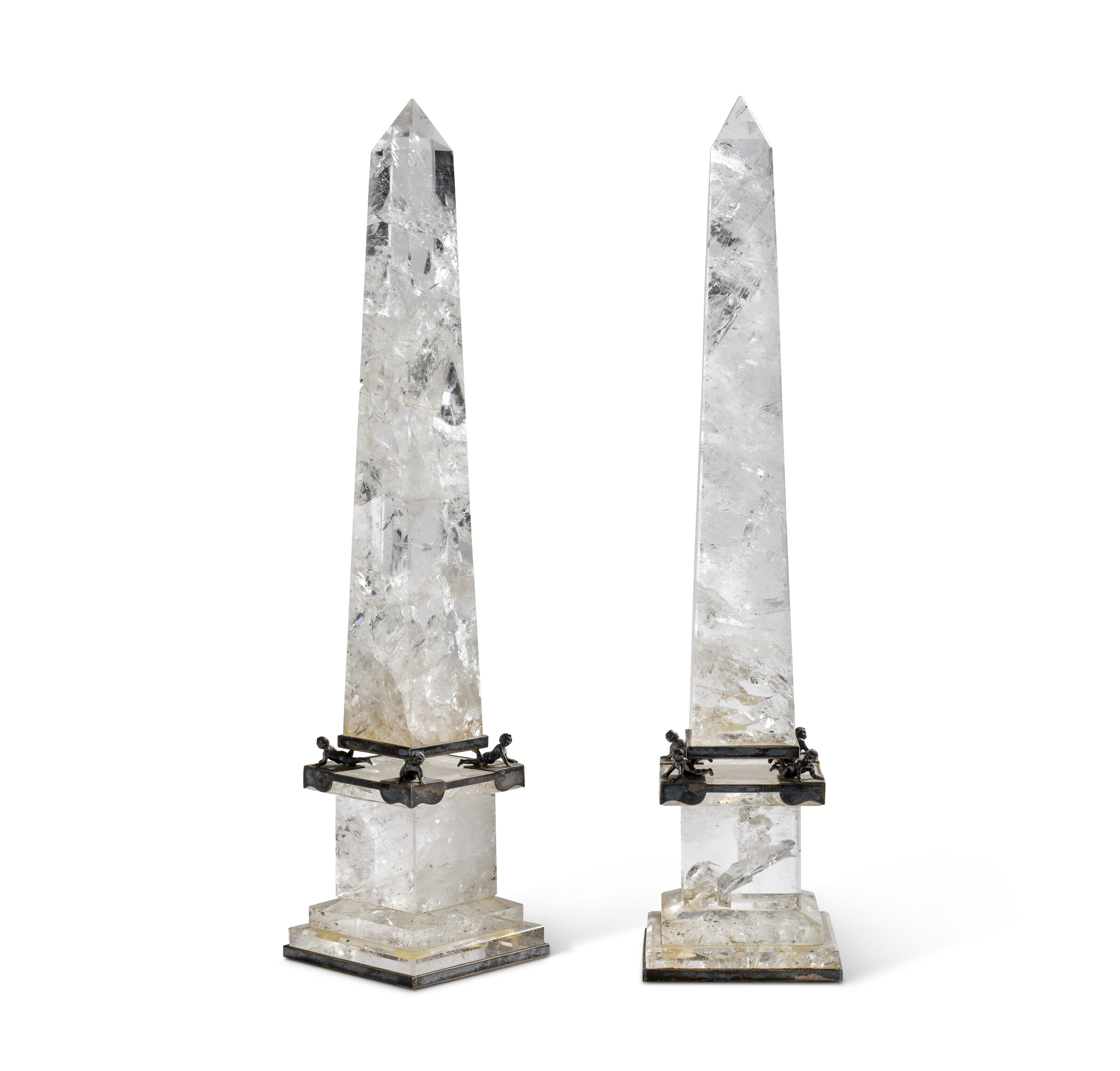 UNA COPPIA DI OBELISCHI IN CRISTALLO DI ROCCA MONTATI IN ARGENTO DORATO ...