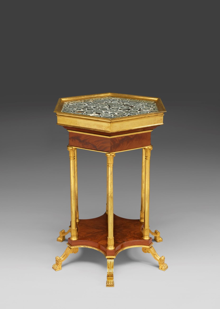 A CONSULAT ORMOLU-MOUNTED MAHOGANY AND GRANIT OBICULAIRE GUERIDON ...