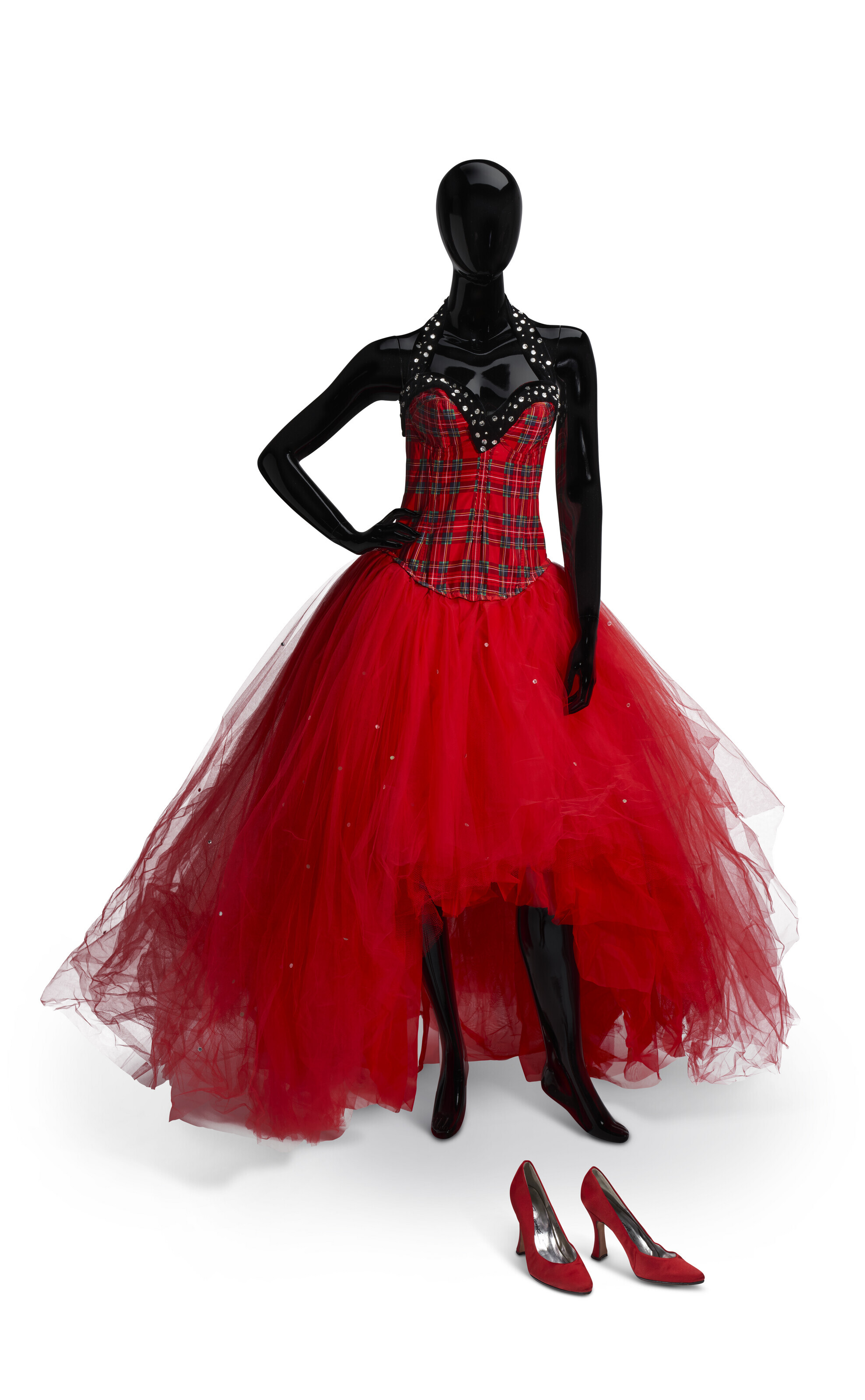 A PLAID AND RED TULLE EVENING DRESS WITH BLACK VELVET HALTER NECKLINE ...