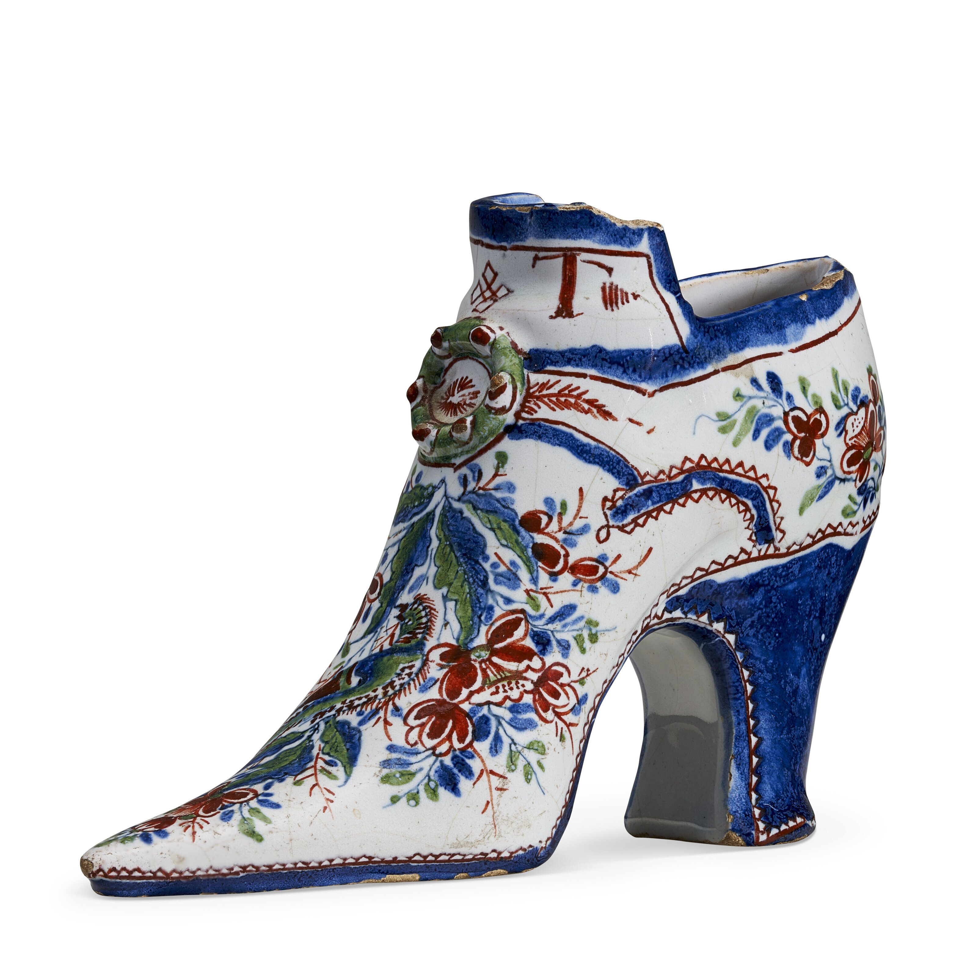 A DUTCH DELFT POLYCHROME INITIALED MODEL OF A SHOE, CIRCA 1750 | Christie’s