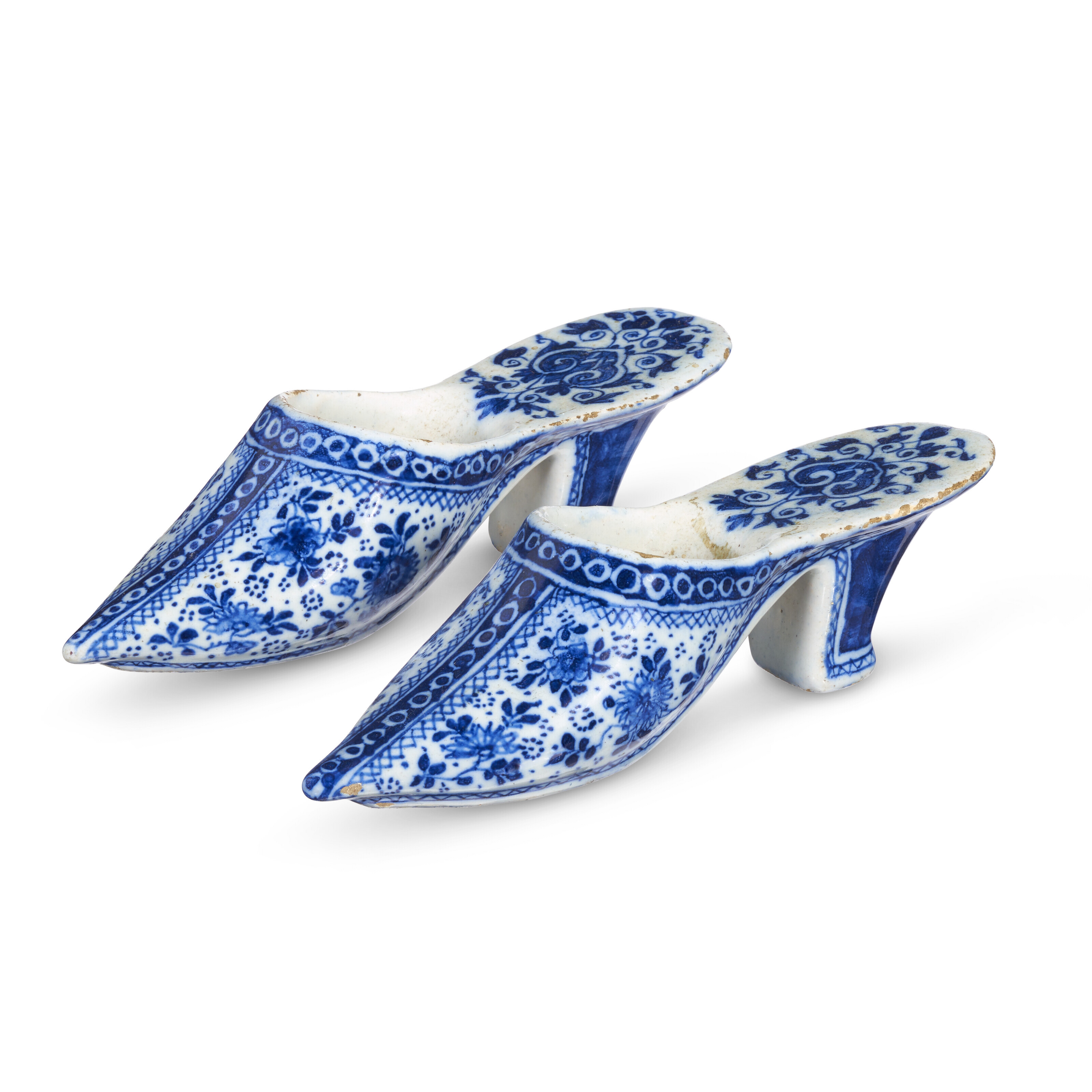 A PAIR OF DUTCH DELFT BLUE AND WHITE INITIALED MODELS OF SHOES, 18TH ...