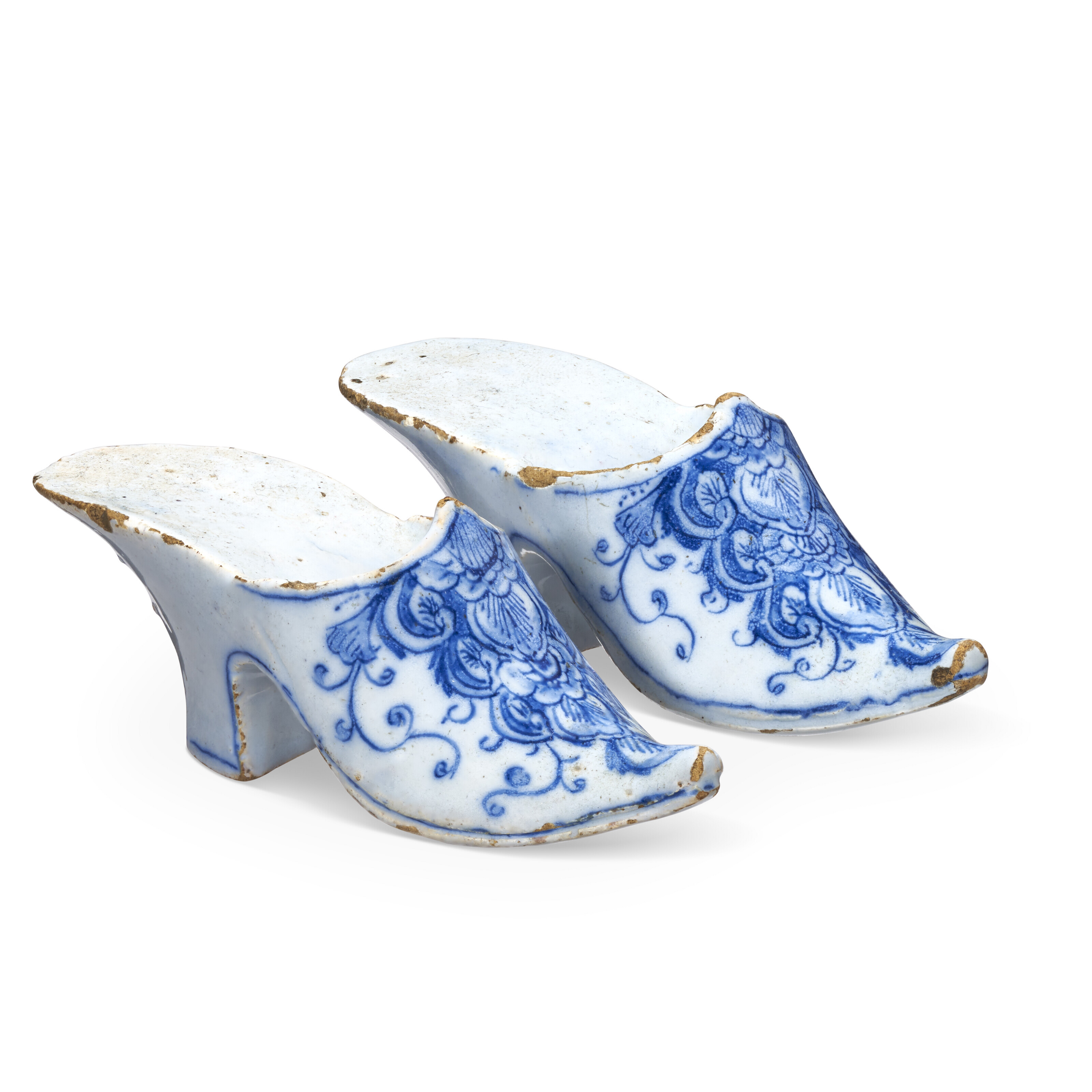 A PAIR OF DUTCH DELFT BLUE AND WHITE MODELS OF SHOES, 18TH CENTURY ...