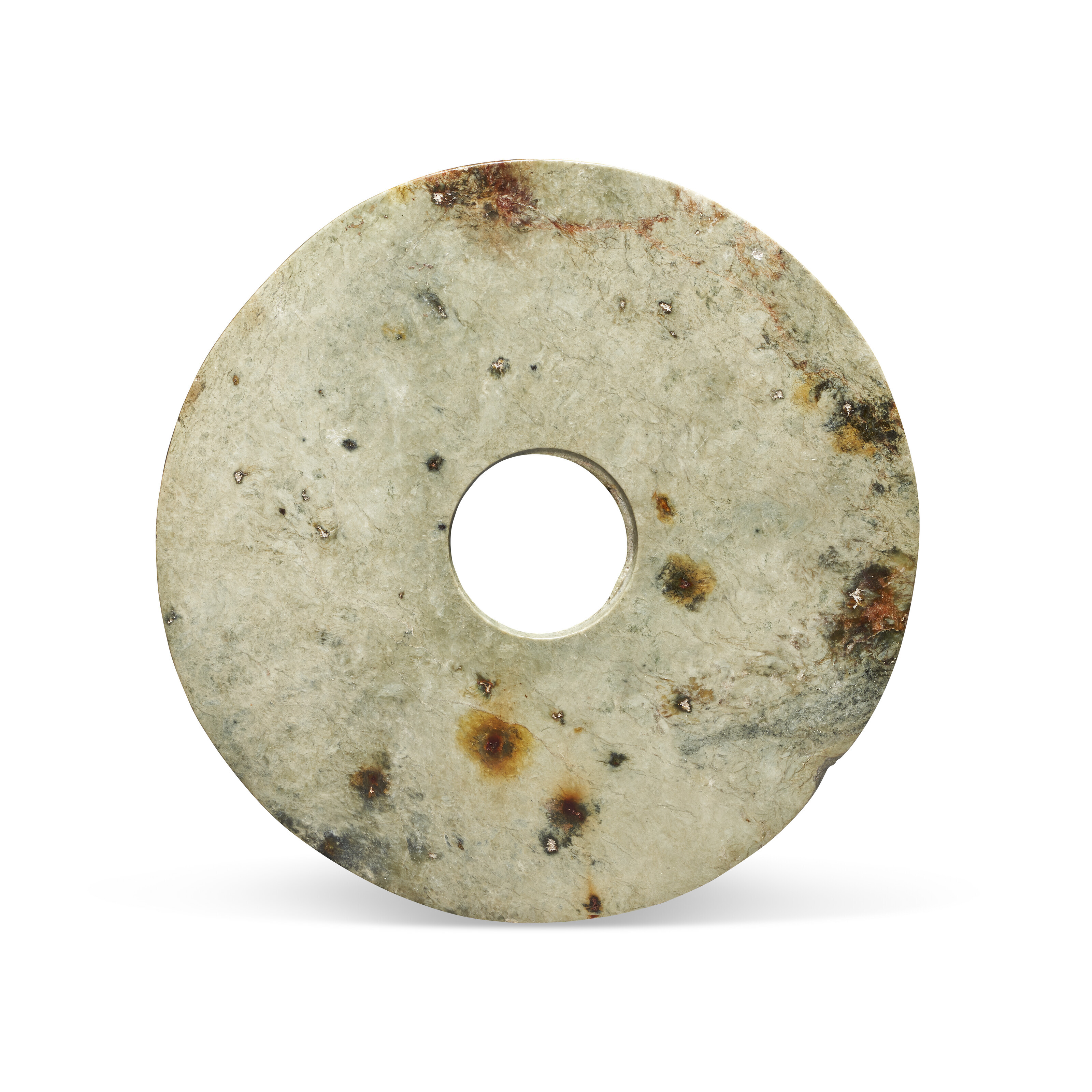 AN OPAQUE MOTTLED OLIVE-GREEN JADE DISC, BI, CHINA, NEOLITHIC PERIOD ...