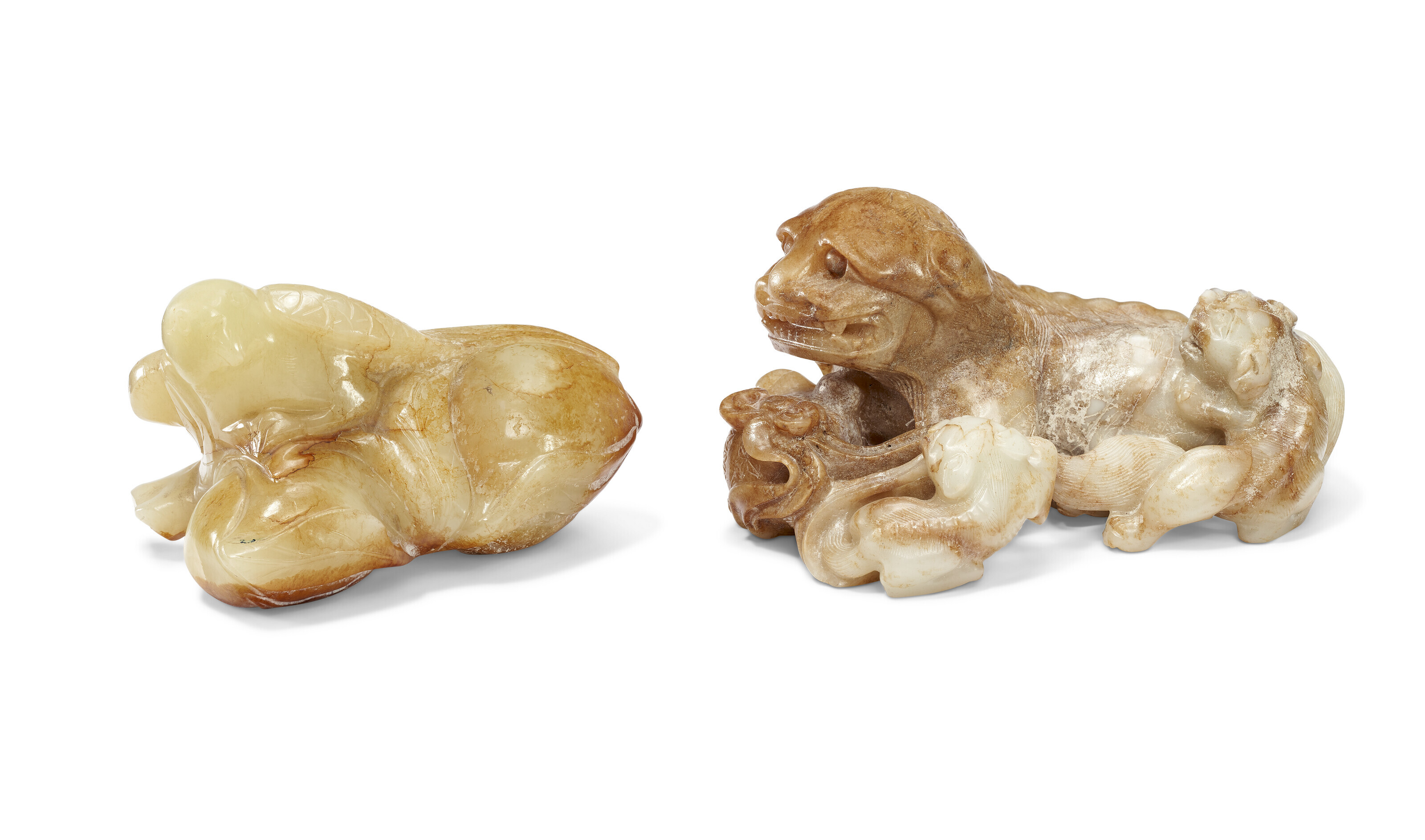A BEIGE JADE CARVING OF A BIRD AND A WHITE AND RUSSET JADE CARVING OF A ...