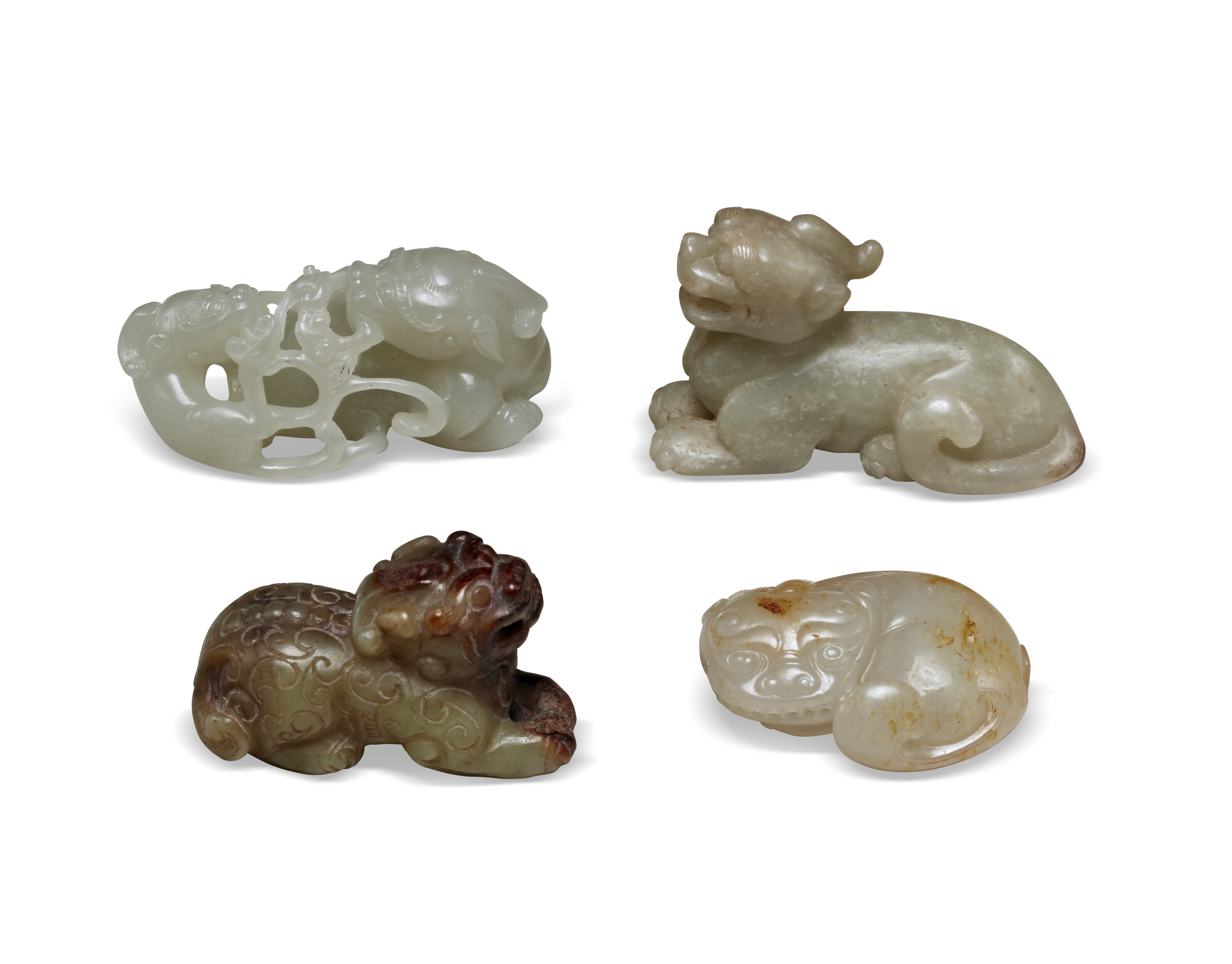 FOUR JADE CARVINGS OF MYTHICAL BEASTS, CHINA, LATE QING DYNASTY ...