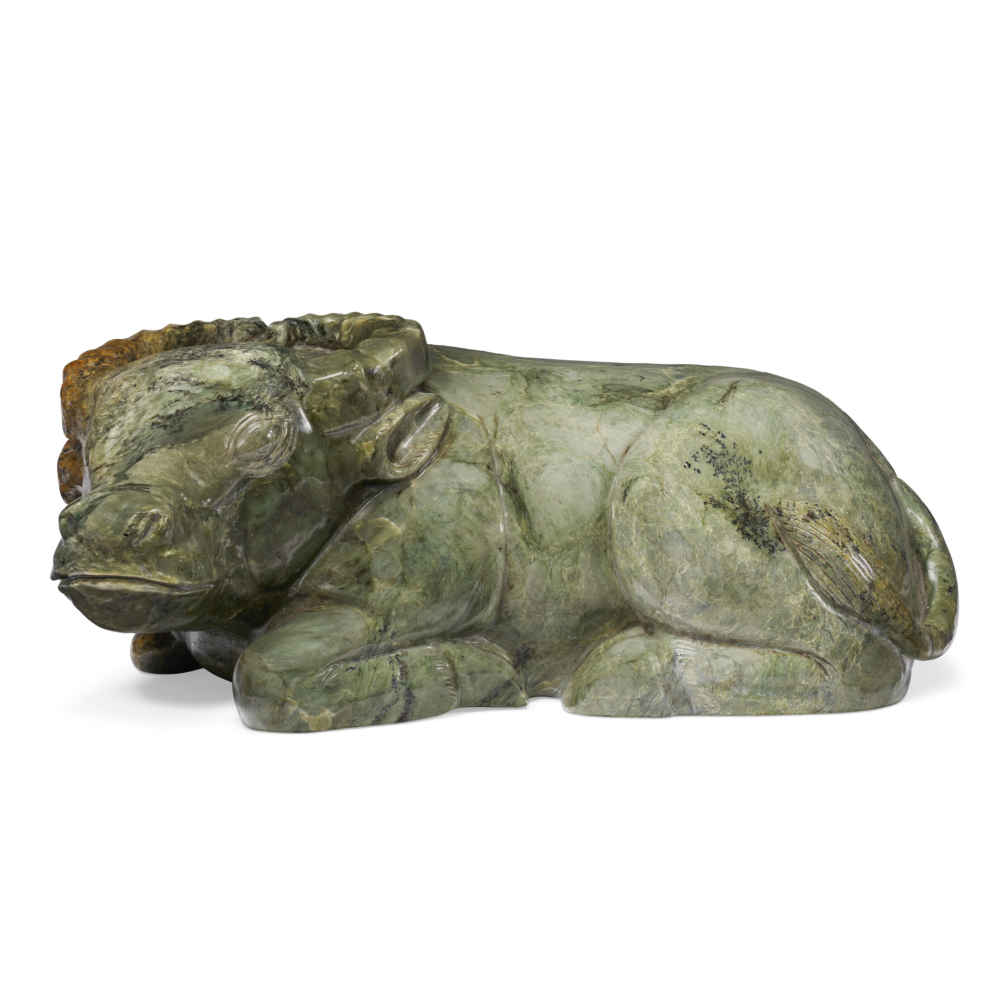 A LARGE SPINACH-GREEN JADE FIGURE OF A RECUMBENT OX, CHINA, LATE 19TH ...