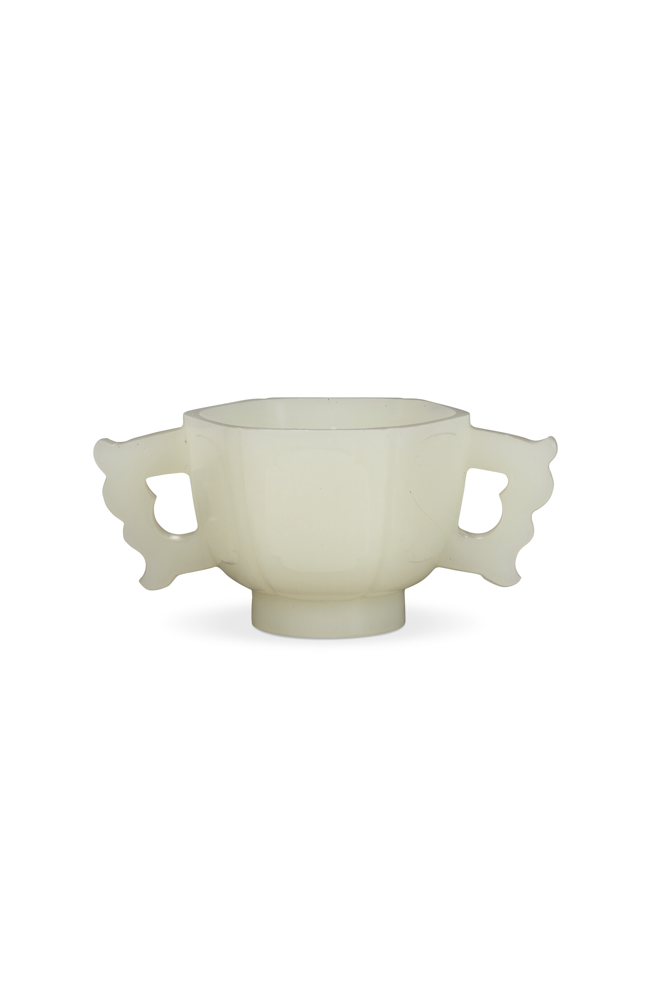 A TWO-HANDLED WHITE GLASS HEXAGONAL CUP, CHINA, LATE MING-EARLY QING ...