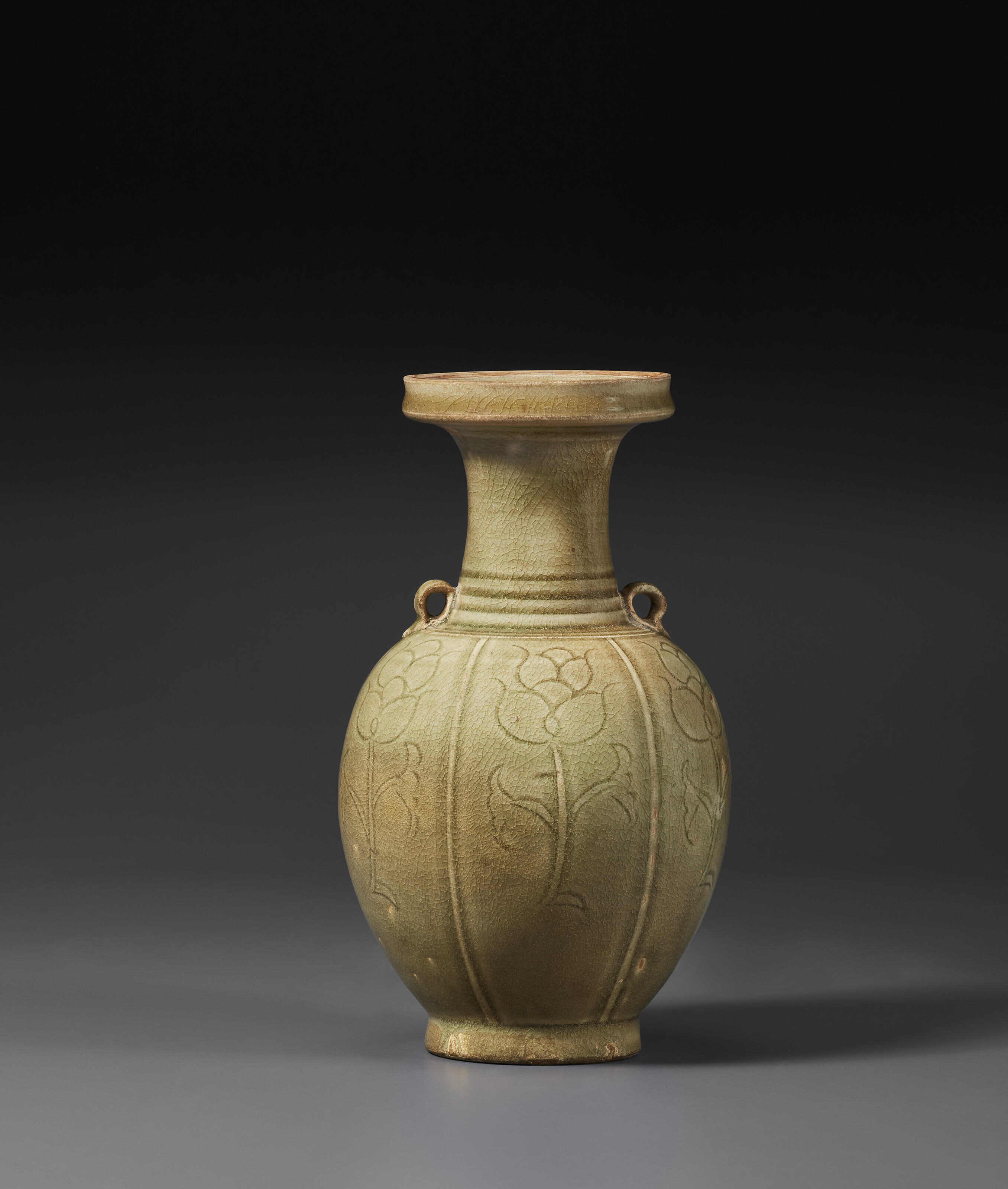 A RARE SMALL GLAZED WHITE WARE LION-HANDLED EWER, TANG DYNASTY, 9TH ...