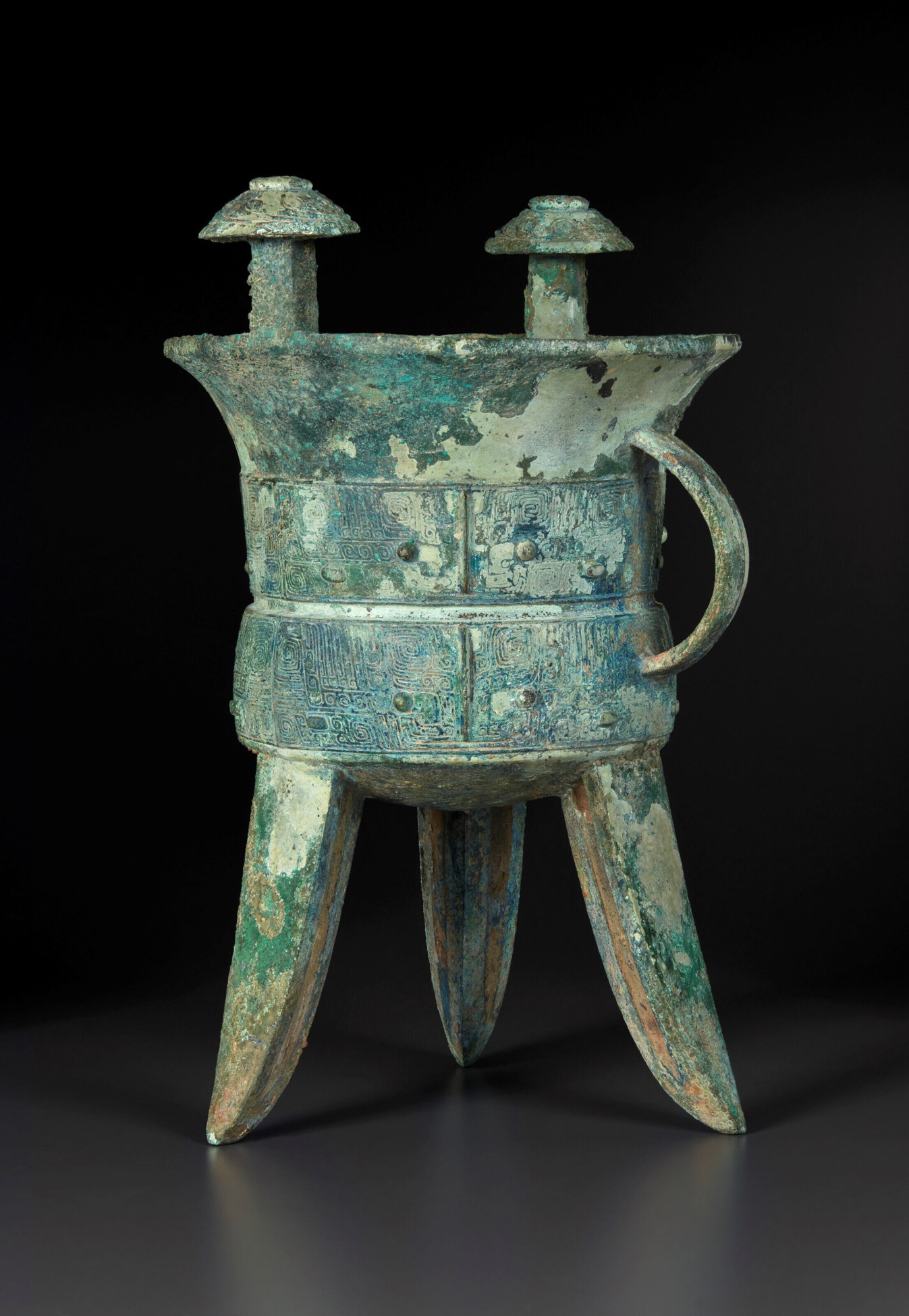 A RARE LARGE BRONZE TRIPOD WINE VESSEL, JIA, SHANG DYNASTY, EARLY ...