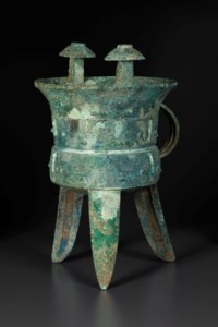 A RARE LARGE BRONZE TRIPOD WINE VESSEL, JIA, SHANG DYNASTY, EARLY ...