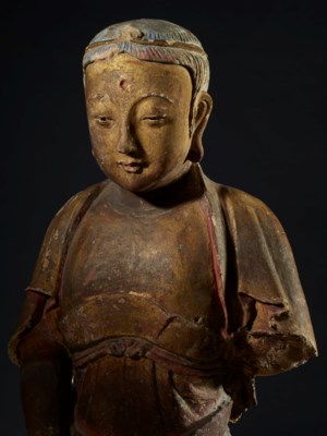 A RARE LARGE PAINTED AND GILT STUCCO FIGURE OF A SEATED BODHISATTVA ...