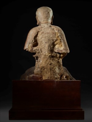 A RARE LARGE PAINTED AND GILT STUCCO FIGURE OF A SEATED BODHISATTVA ...