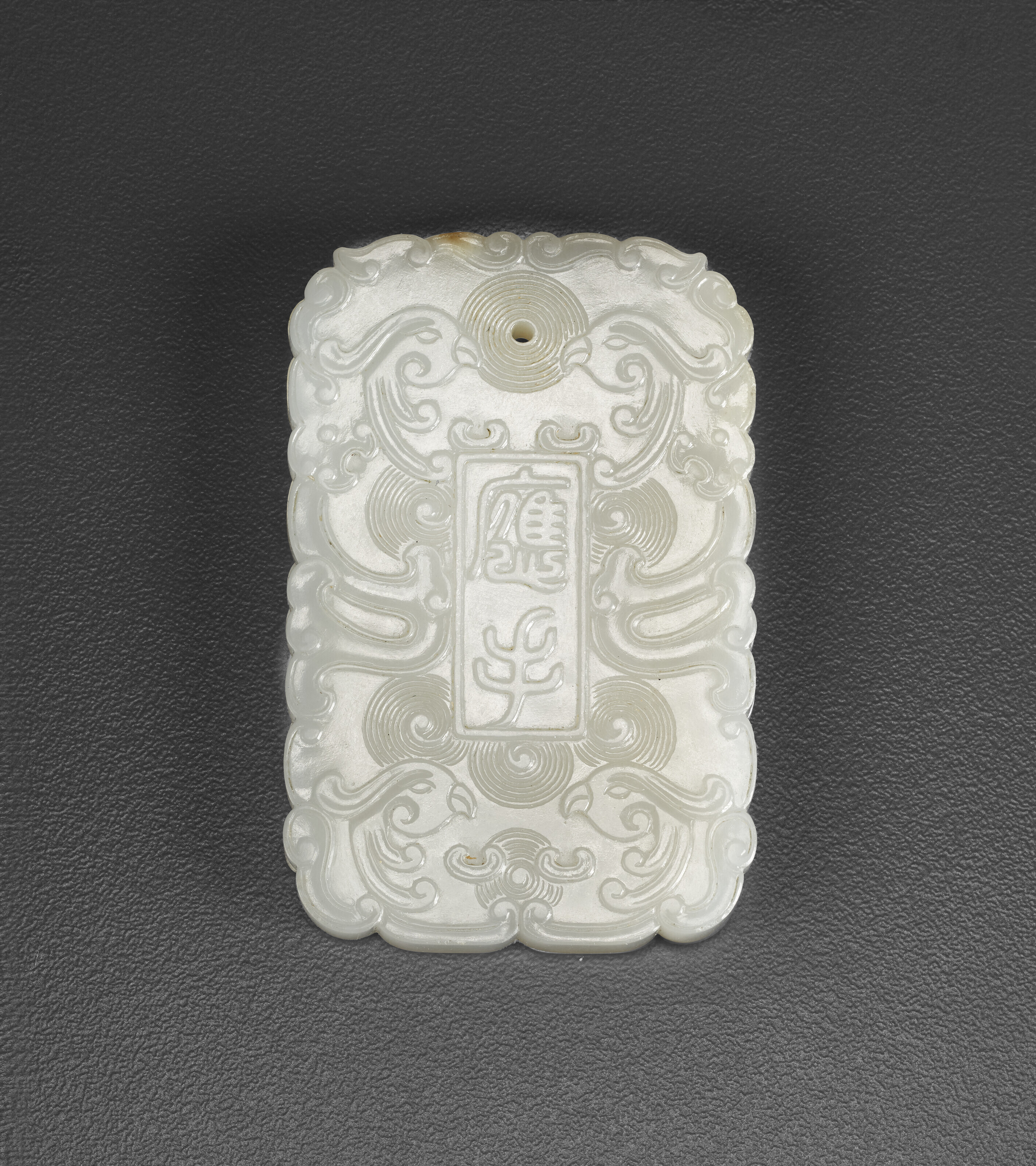 A PALE GREENISH-WHITE JADE `ENDLESS KNOT' PENDANT, 18TH-19TH CENTURY ...