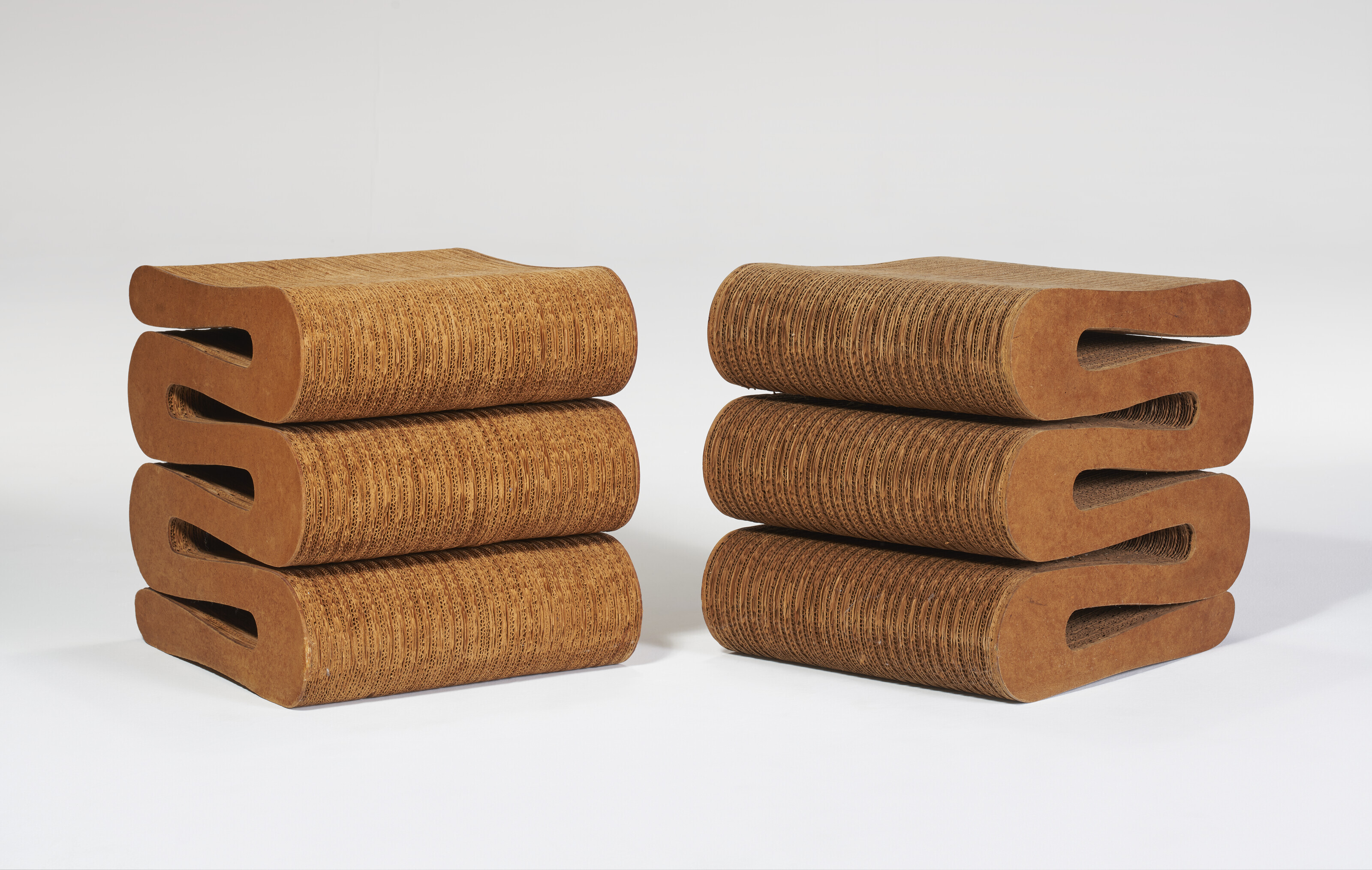 FRANK GEHRY (B. 1929), Pair of 'Wiggle' Stools, circa 1972 | Christie’s