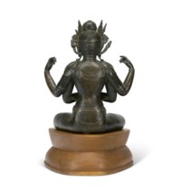 A LARGE SILVER- AND COPPER-INLAID BRONZE FIGURE OF SHADAKSHARI ...