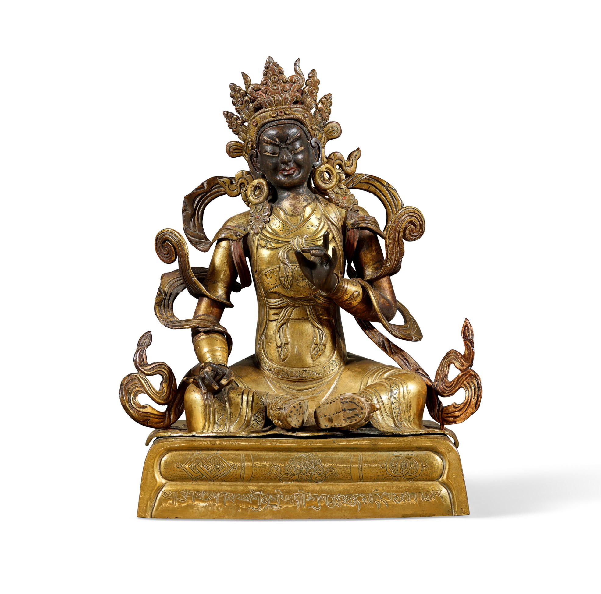 A REPOUSSE GILT-BRONZE FIGURE OF A CELESTIAL GUARDIAN, INNER MONGOLIA ...