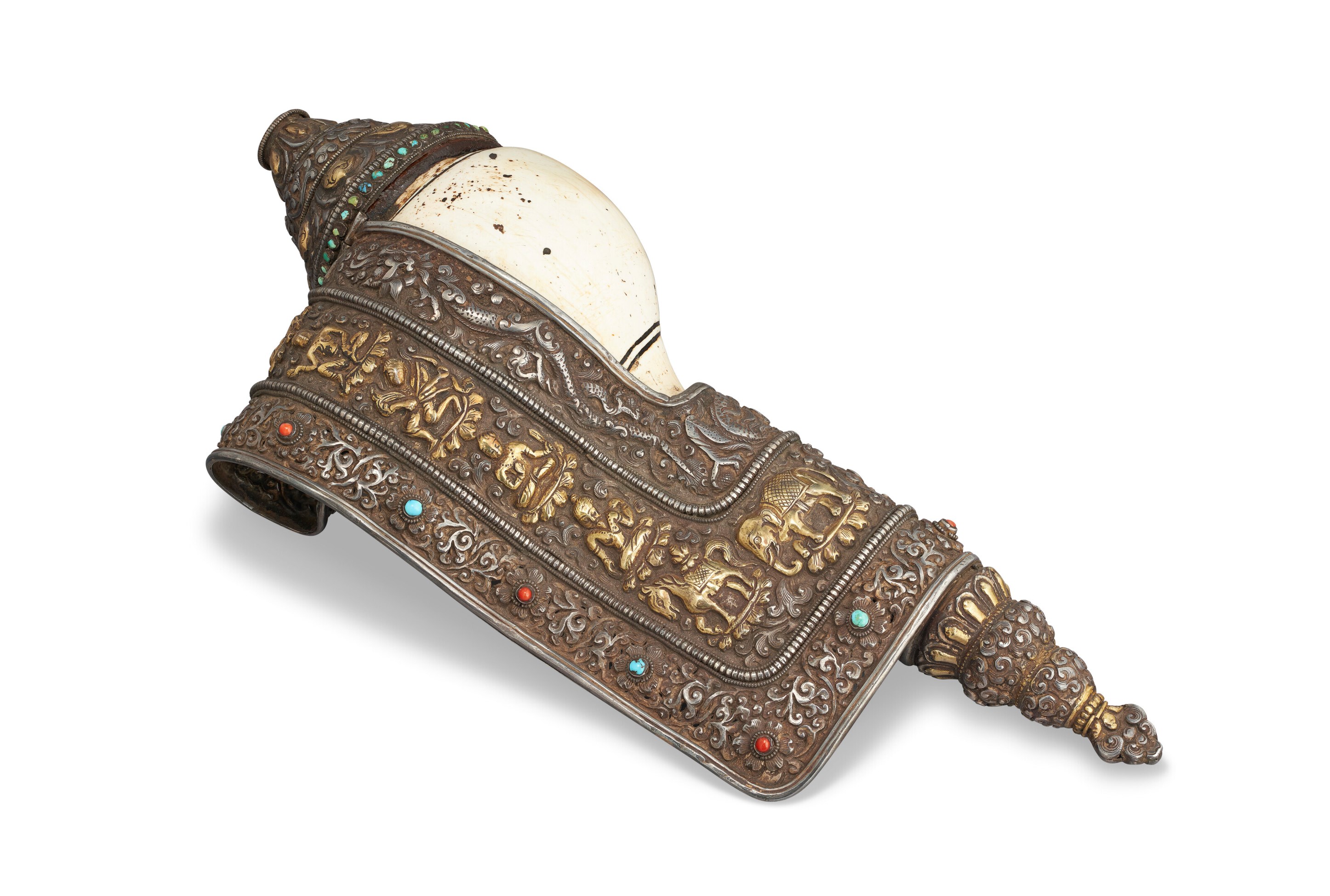 A PARCEL-GILT MIXED-METAL-MOUNTED CONCH SHELL, TIBET, 17TH-18TH CENTURY ...