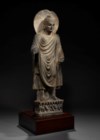 A LARGE AND IMPORTANT GREY SCHIST FIGURE OF BUDDHA SHAKYAMUNI, ANCIENT REGION OF GANDHARA, 3RD ...
