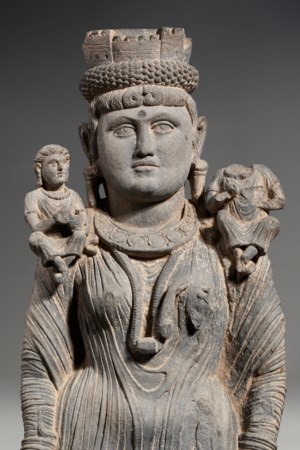 A LARGE AND IMPORTANT GREY SCHIST FIGURE OF HARITI WITH CHILDREN