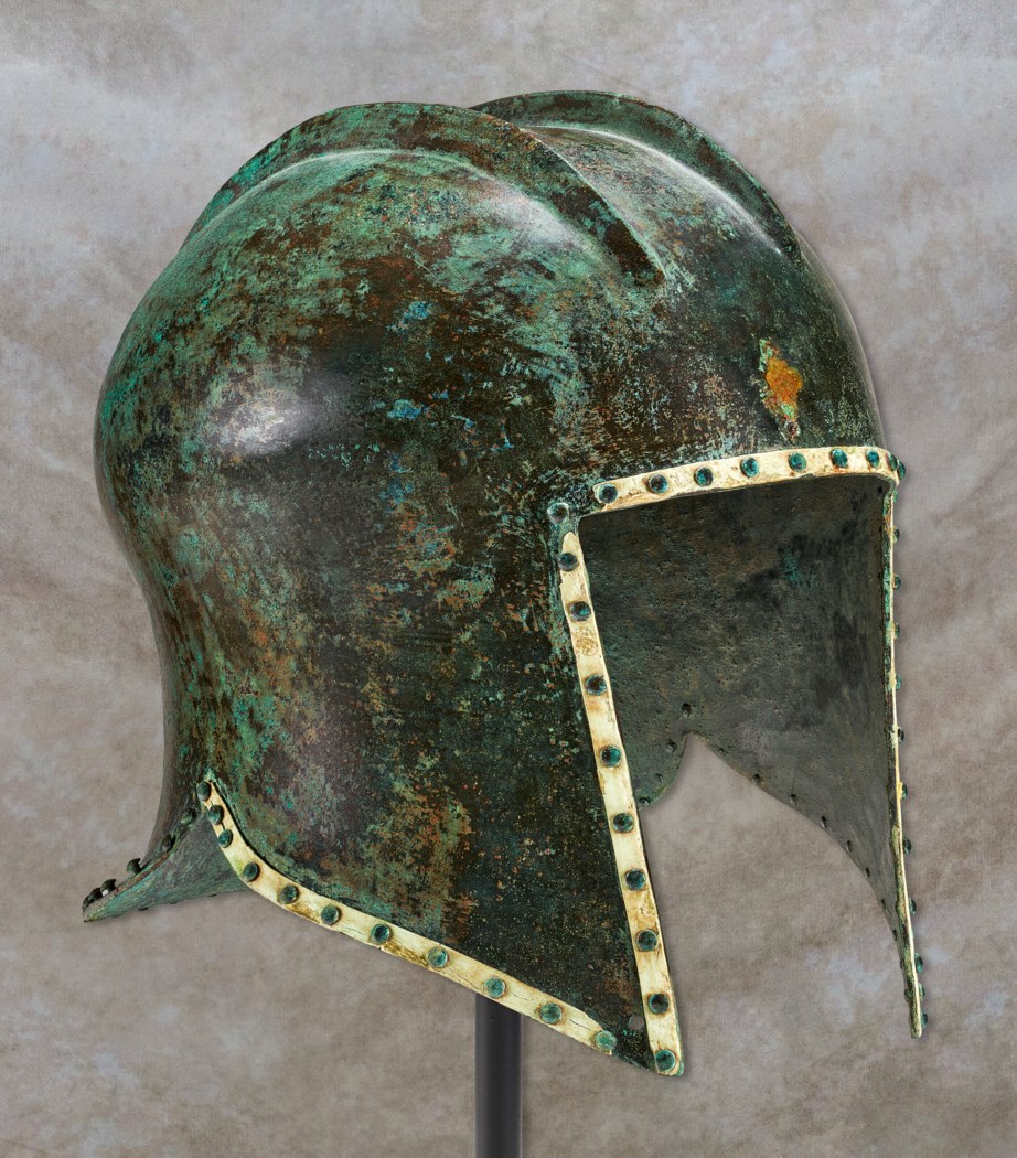 A GREEK BRONZE AND BONE ILLYRIAN HELMET, ARCHAIC PERIOD, CIRCA EARLY TO ...