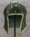 A GREEK BRONZE AND BONE ILLYRIAN HELMET, ARCHAIC PERIOD, CIRCA EARLY TO ...